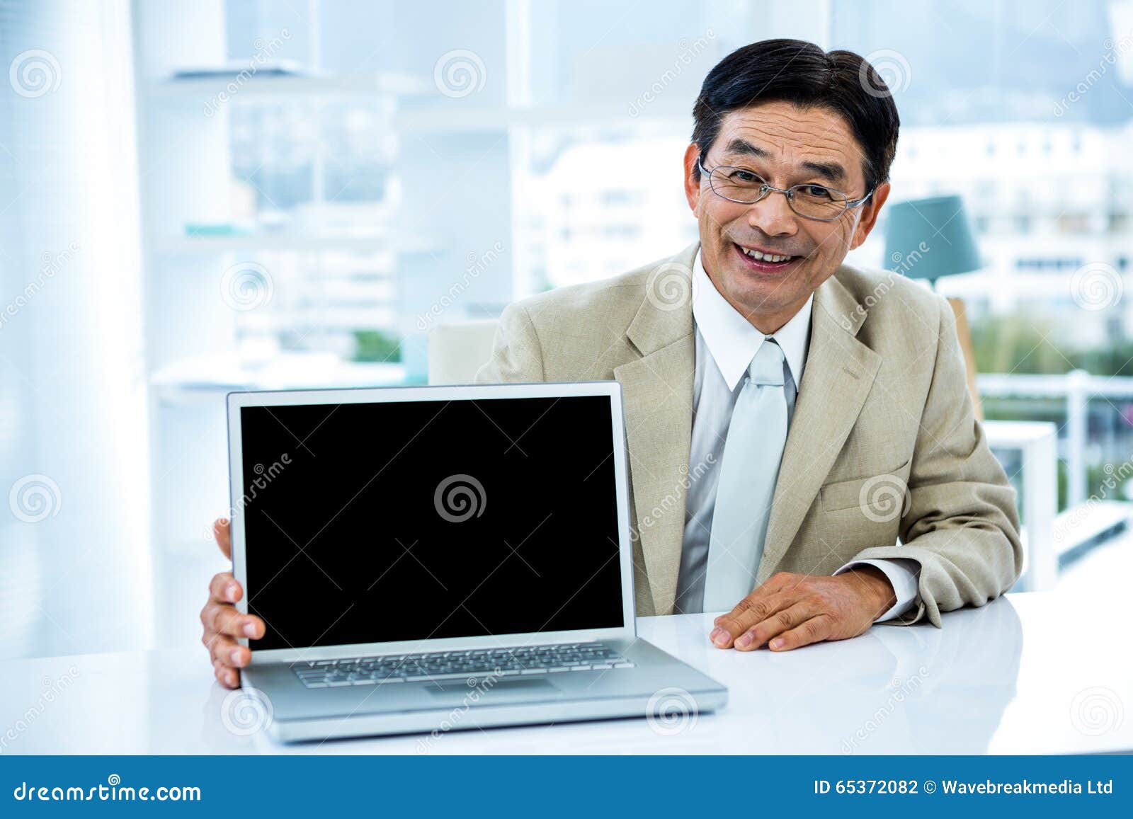 Smiling Asian Businessman Showing His Laptop Stock Photo - Image of ... Smiling Asian Businessman Showing His Laptop Stock Photo - Image of ...