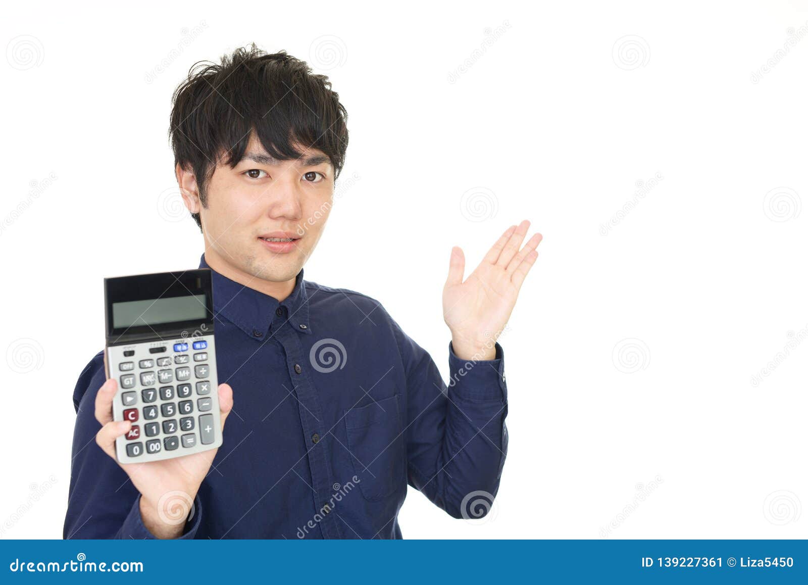 Man holding a calculator stock image. Image of calculator - 139227361