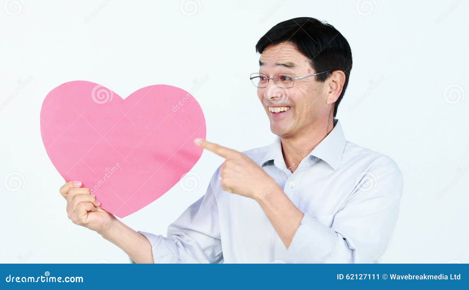 Smiling Asian Man Holding a Pink Heart Stock Video - Video of lover ...