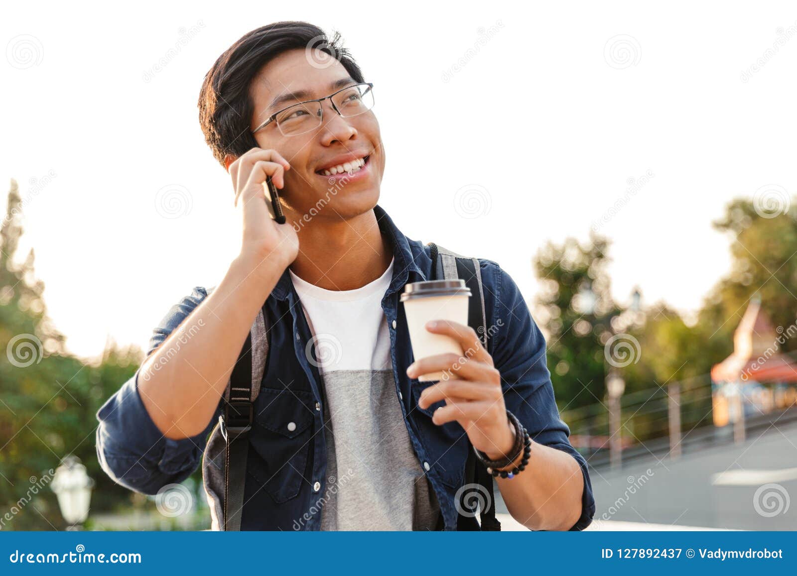 Smiling Asian Man Talking on Mobile Phone Stock Image - Image of male ...