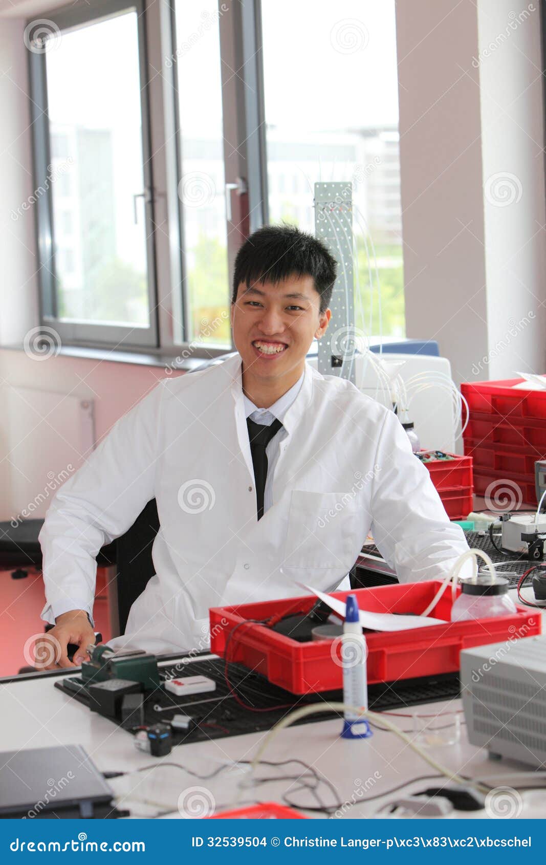 Smiling Asian Man Working in a Laboratory Stock Photo - Image of ...