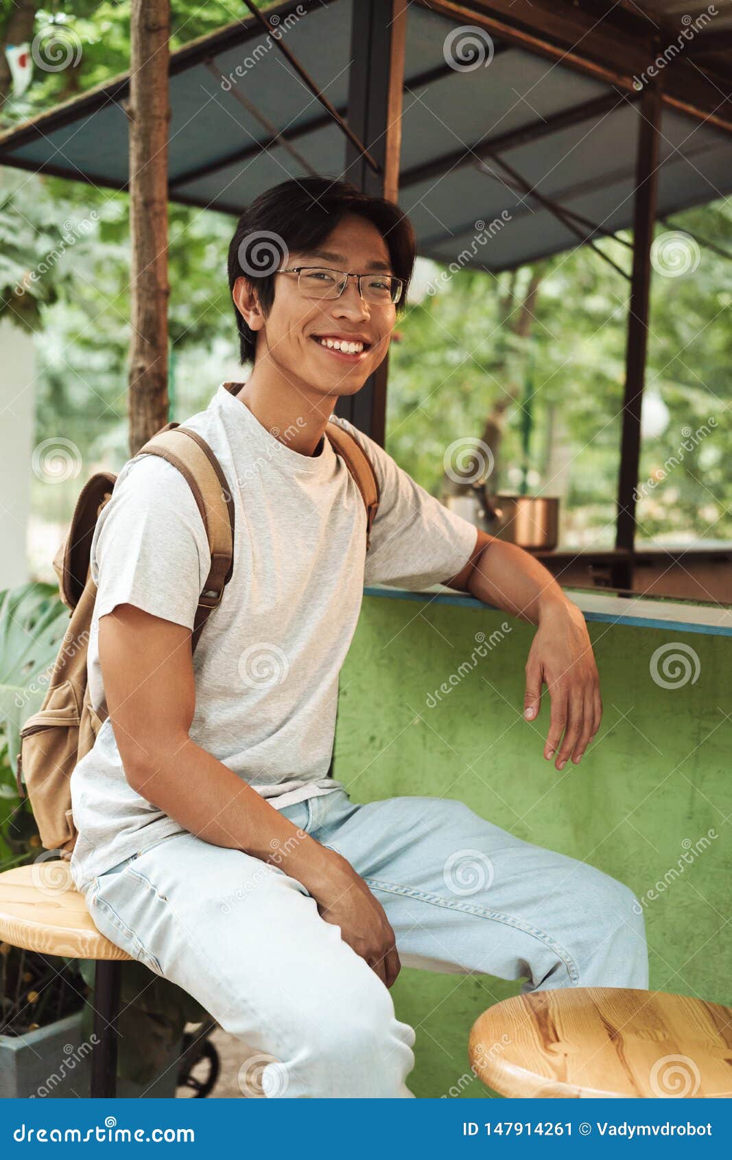Smiling Asian Student Man Wearing Backpack Stock Image - Image of ...