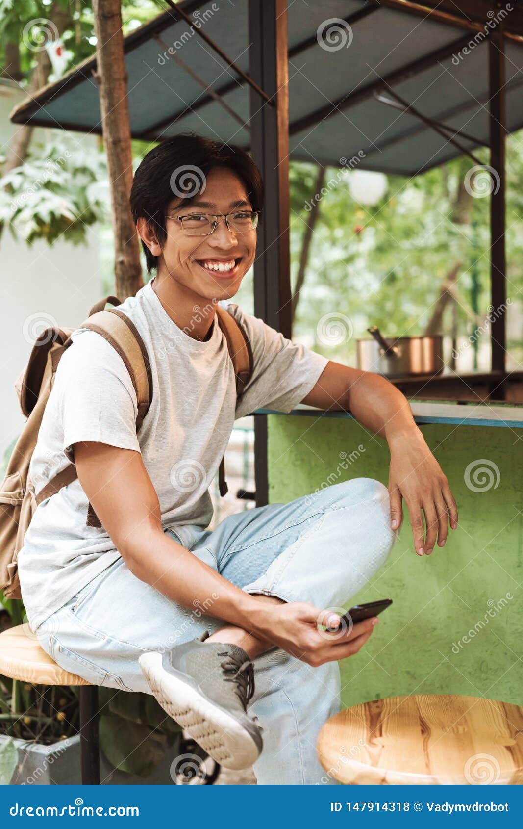 Smiling Asian Student Man Wearing Backpack Stock Photo - Image of back ...