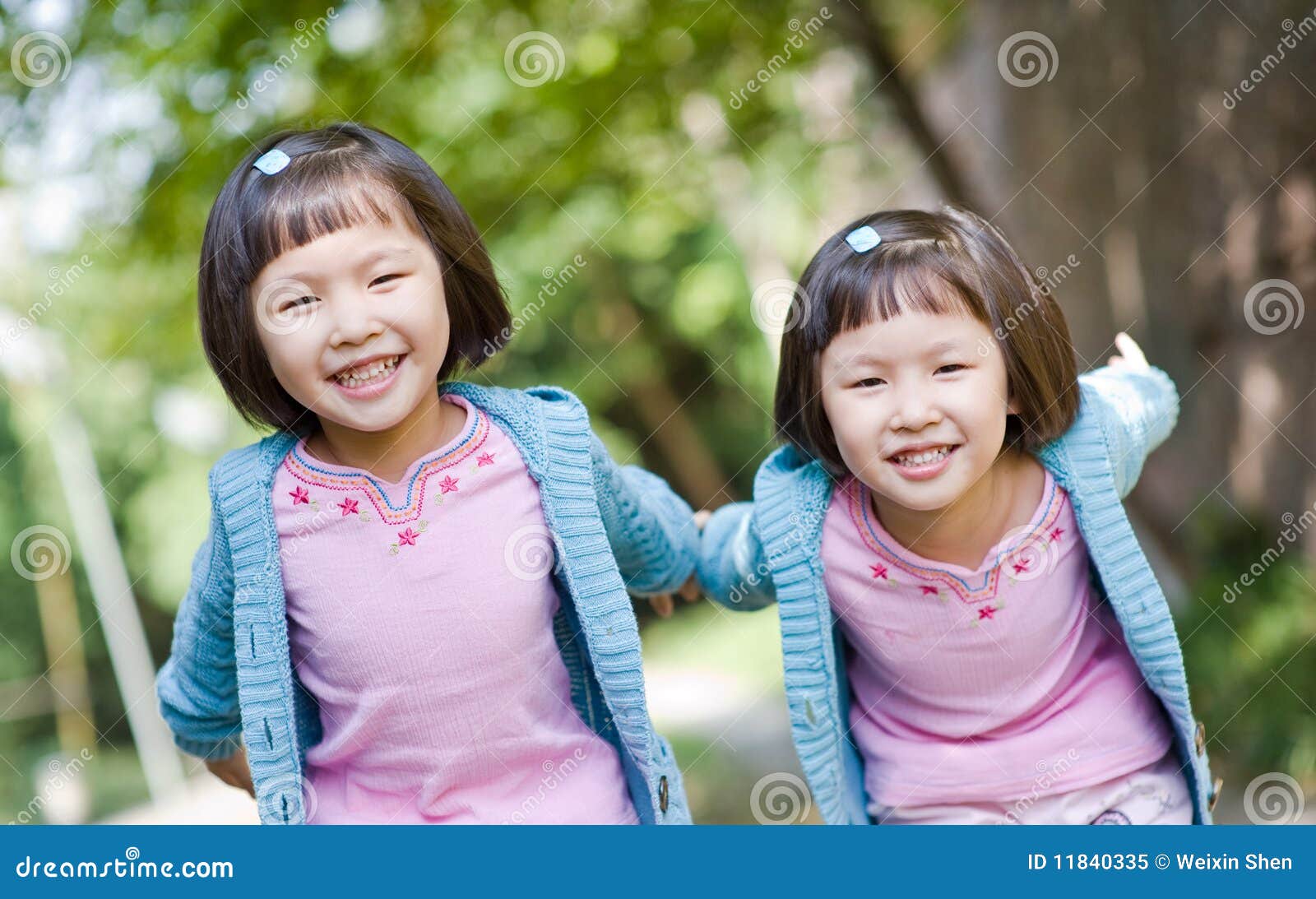 Smiling asian twin girls stock image. Image of hair, happy - 11840335
