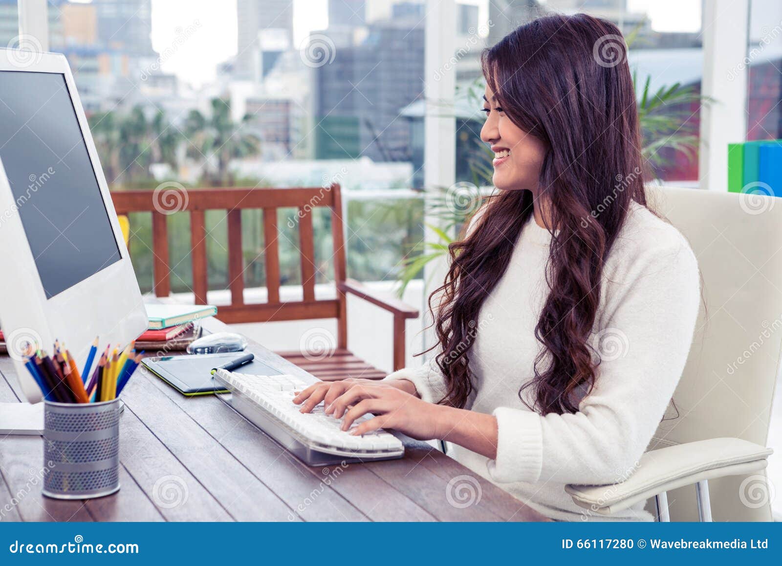 Smiling Asian Woman Using Computer Stock Photo - Image of businesswoman ...