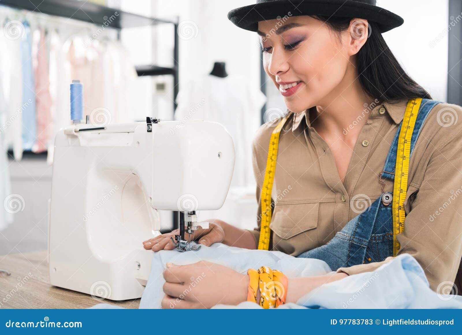 Smiling Asian Woman Working with Sewing Machine Stock Image - Image of ...