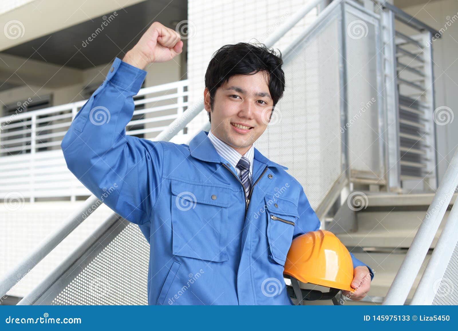 Smiling Asian worker stock image. Image of isolated - 145975133