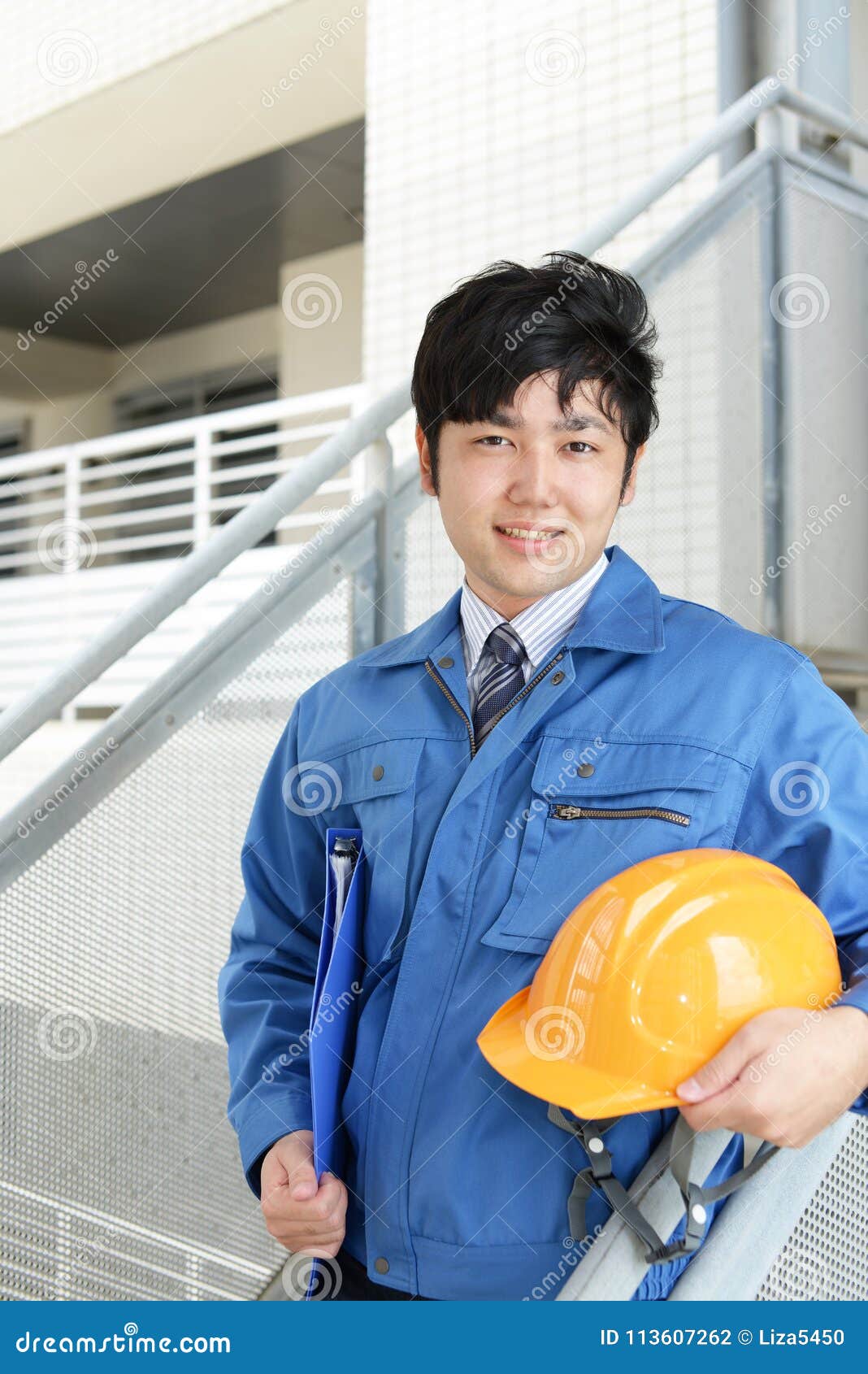 Smiling Asian worker stock photo. Image of construction - 113607262