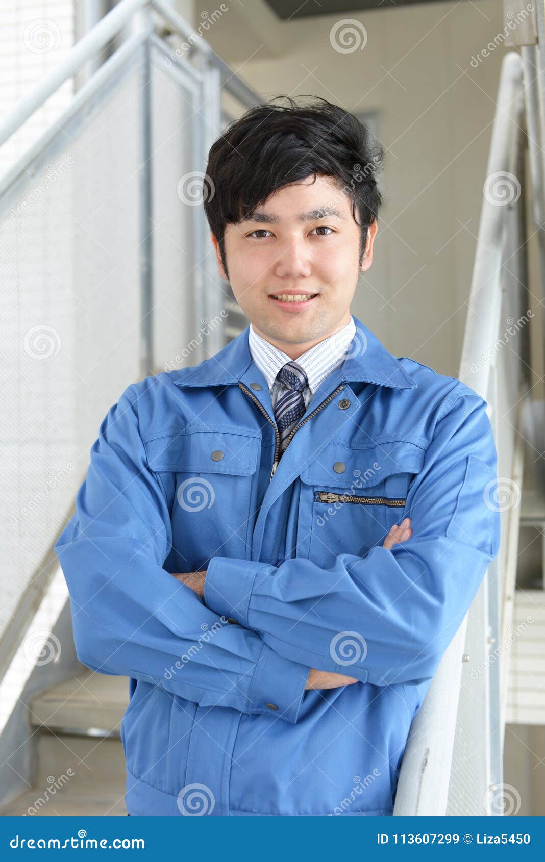 Smiling Asian worker stock image. Image of architecture - 113607299