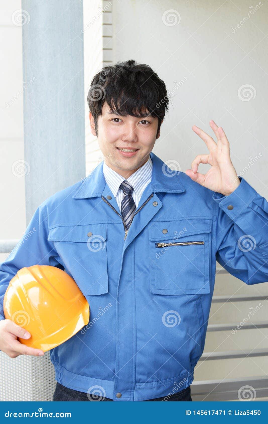 Smiling Asian worker stock image. Image of handsome - 145617471