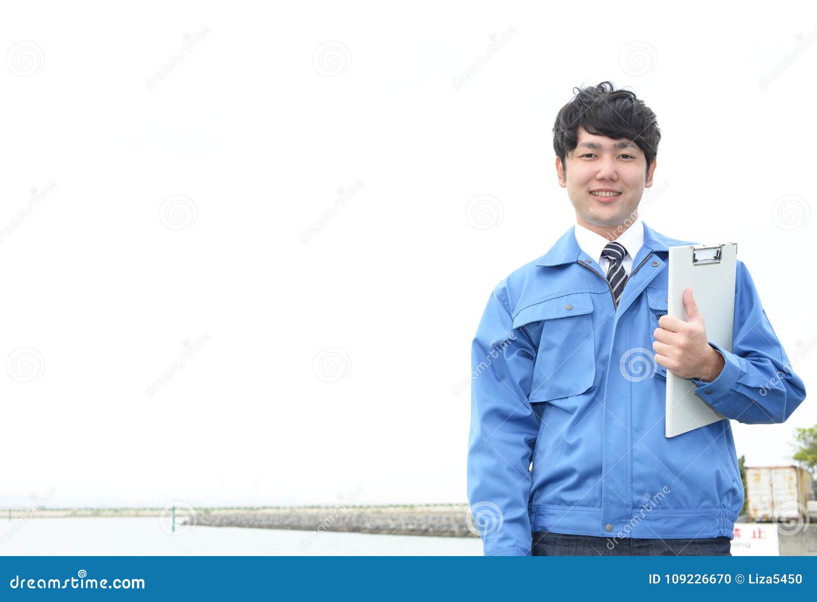 Smiling Asian worker stock photo. Image of masculine - 109226670