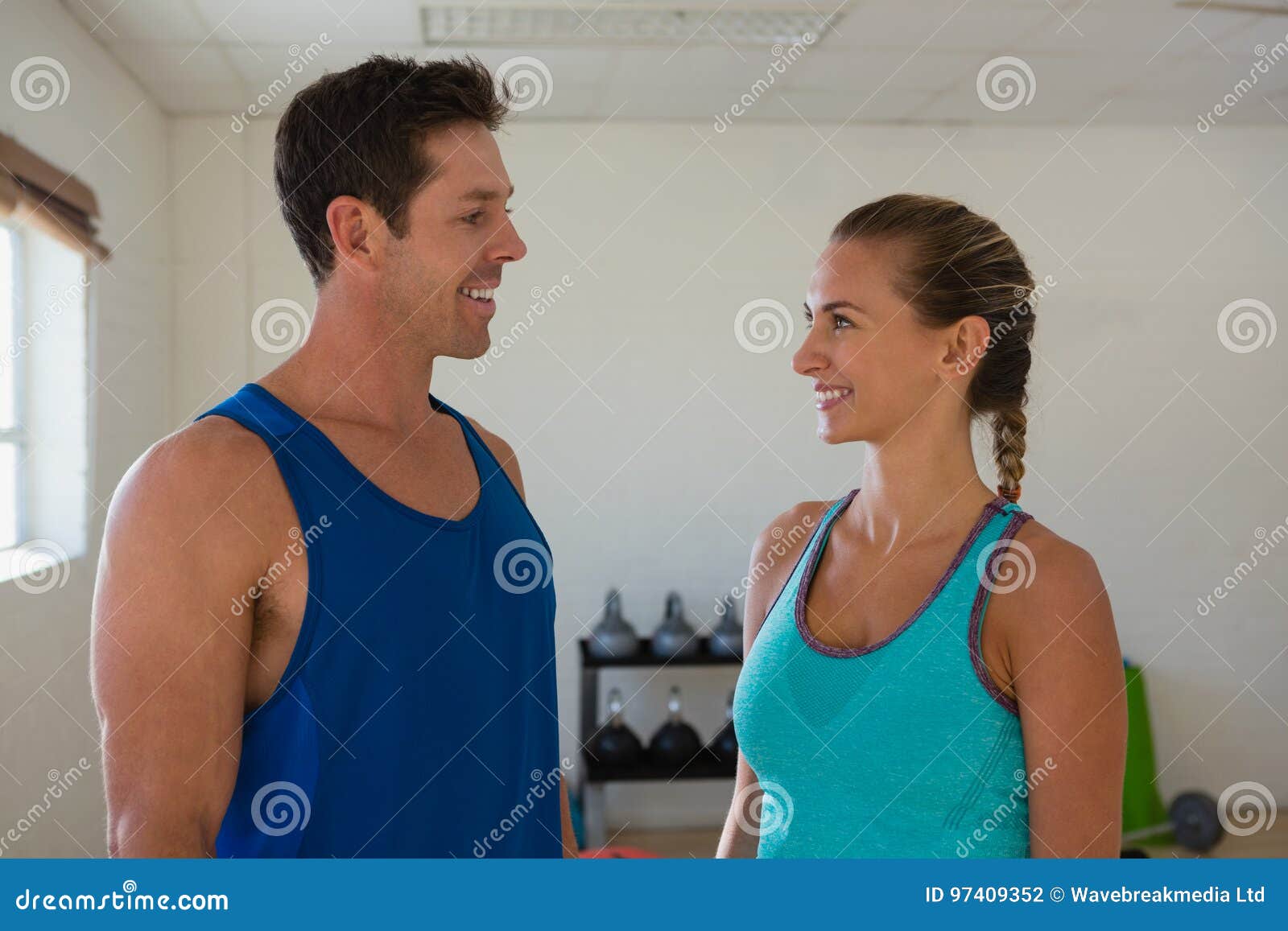 Smiling Athletes Talking in Gym Stock Photo - Image of club, physical ...