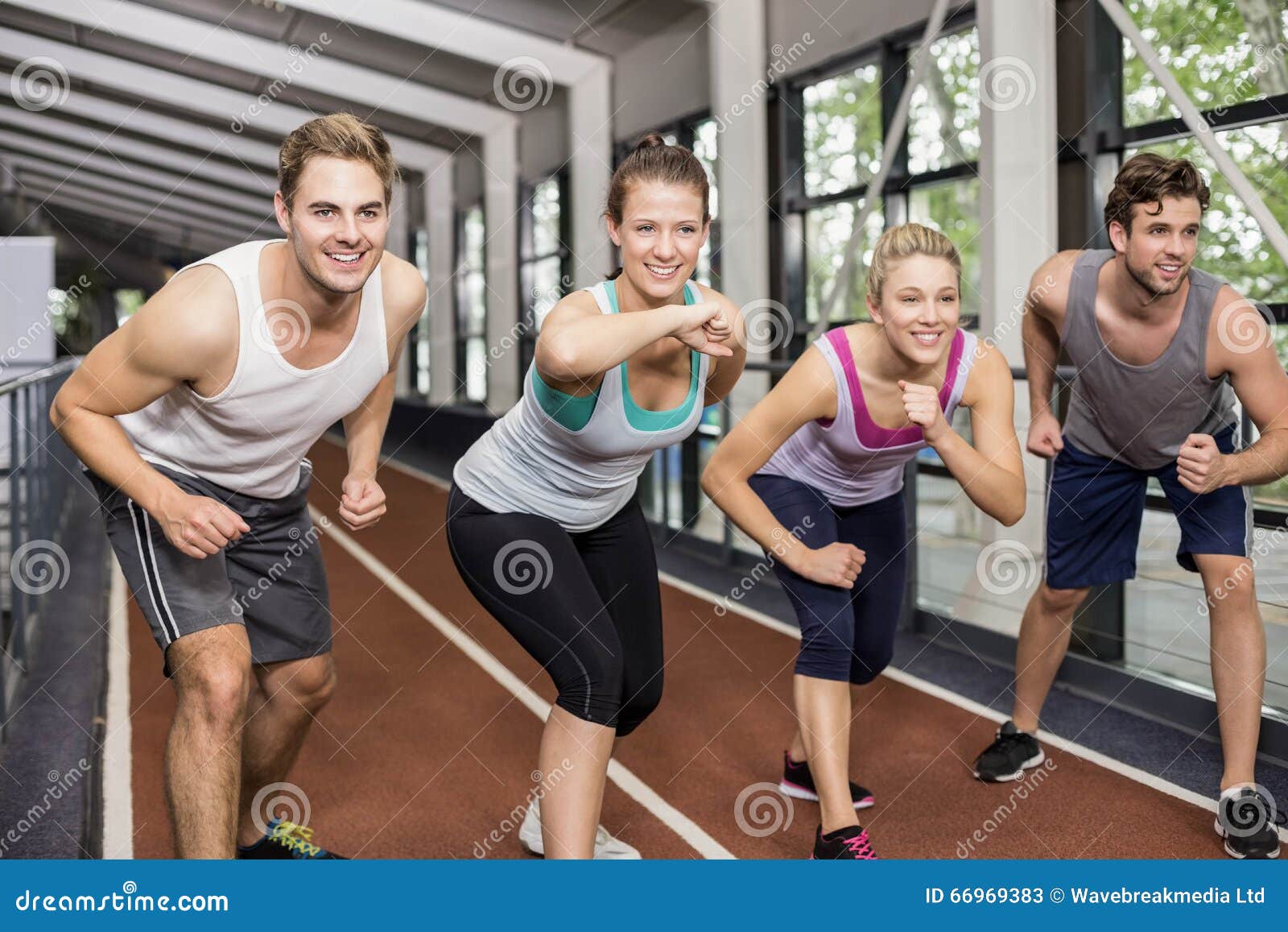 Smiling Athletic Friends Going To Start Running Stock Image - Image of ...