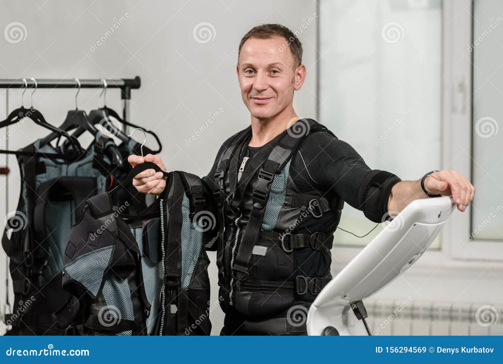Man with EMS equipment stock image. Image of muscle - 156294569