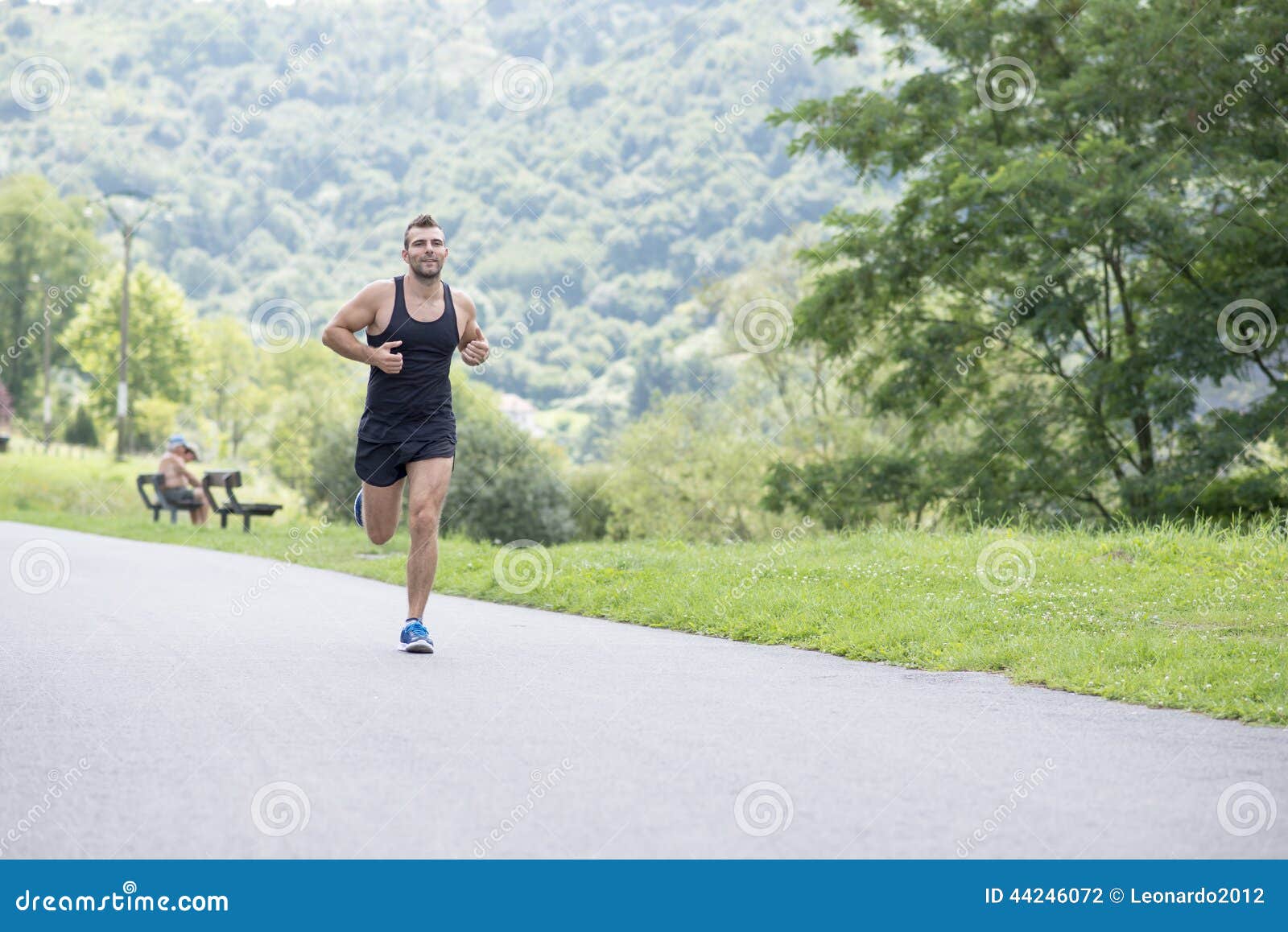 Smiling Athletic Man Running in the Park. Stock Photo - Image of male ...