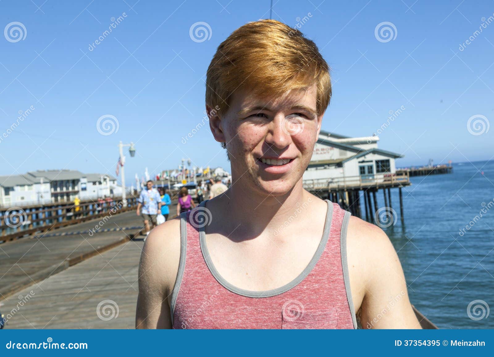 Smiling Attractive Boy Poses at the Pier Stock Image - Image of glance ...
