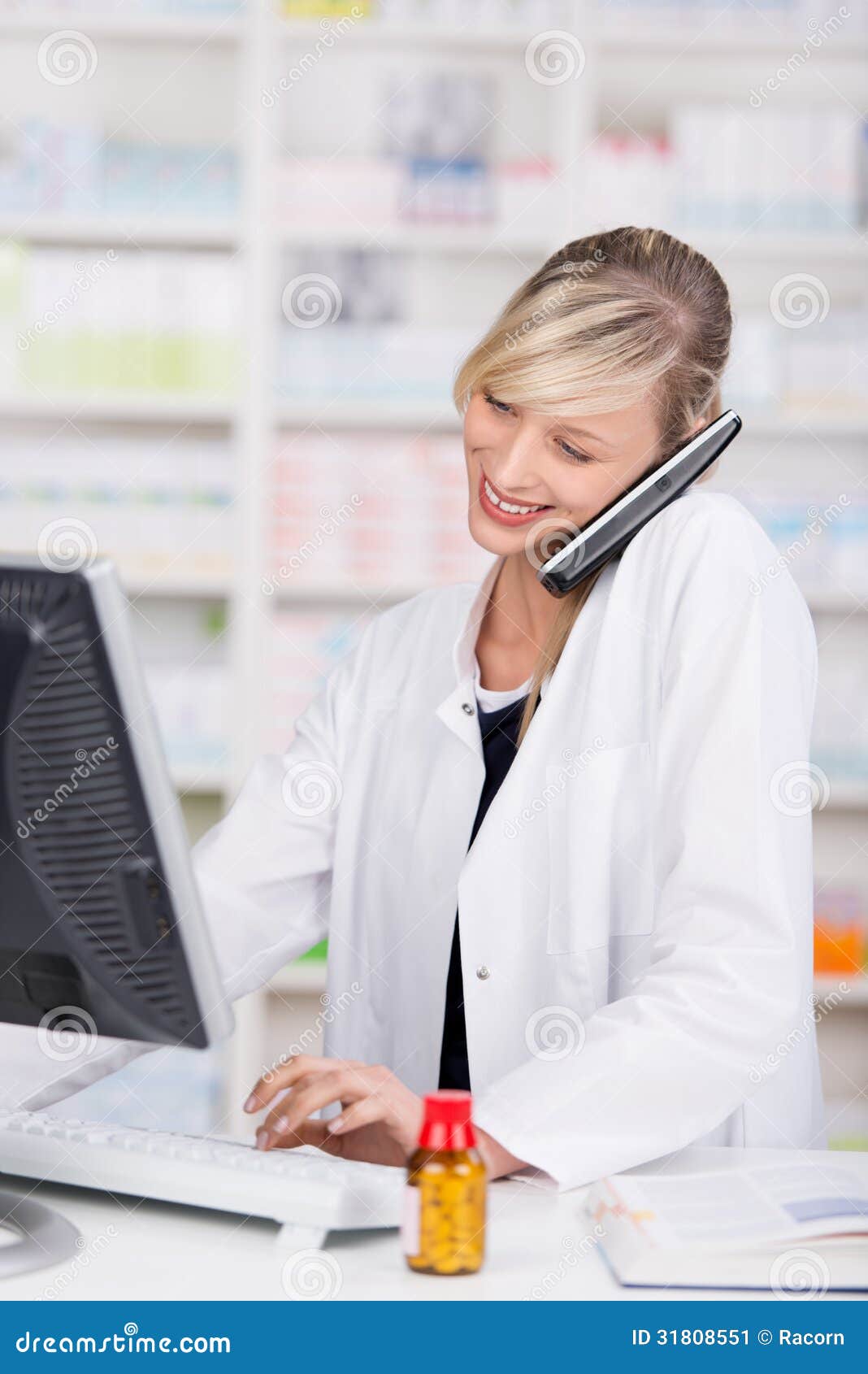 Smiling Attractive Pharmacist Talking at the Phone Stock Image - Image ...