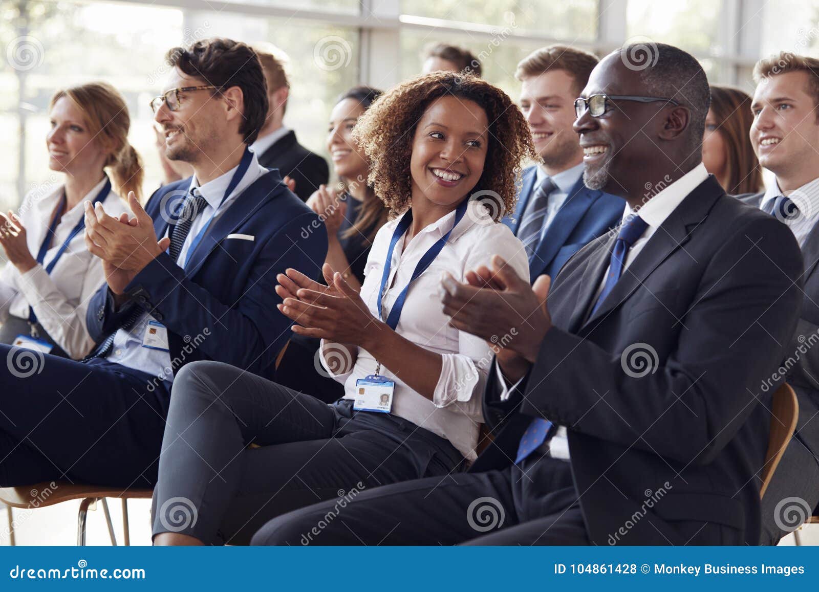 Smiling Audience Applauding at a Business Seminar Stock Photo - Image ...