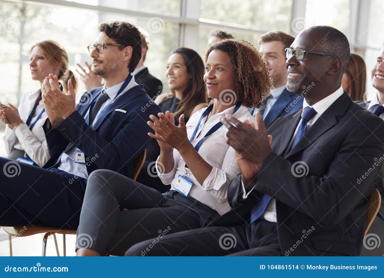 Smiling Audience Applauding at a Business Seminar Stock Photo - Image ...