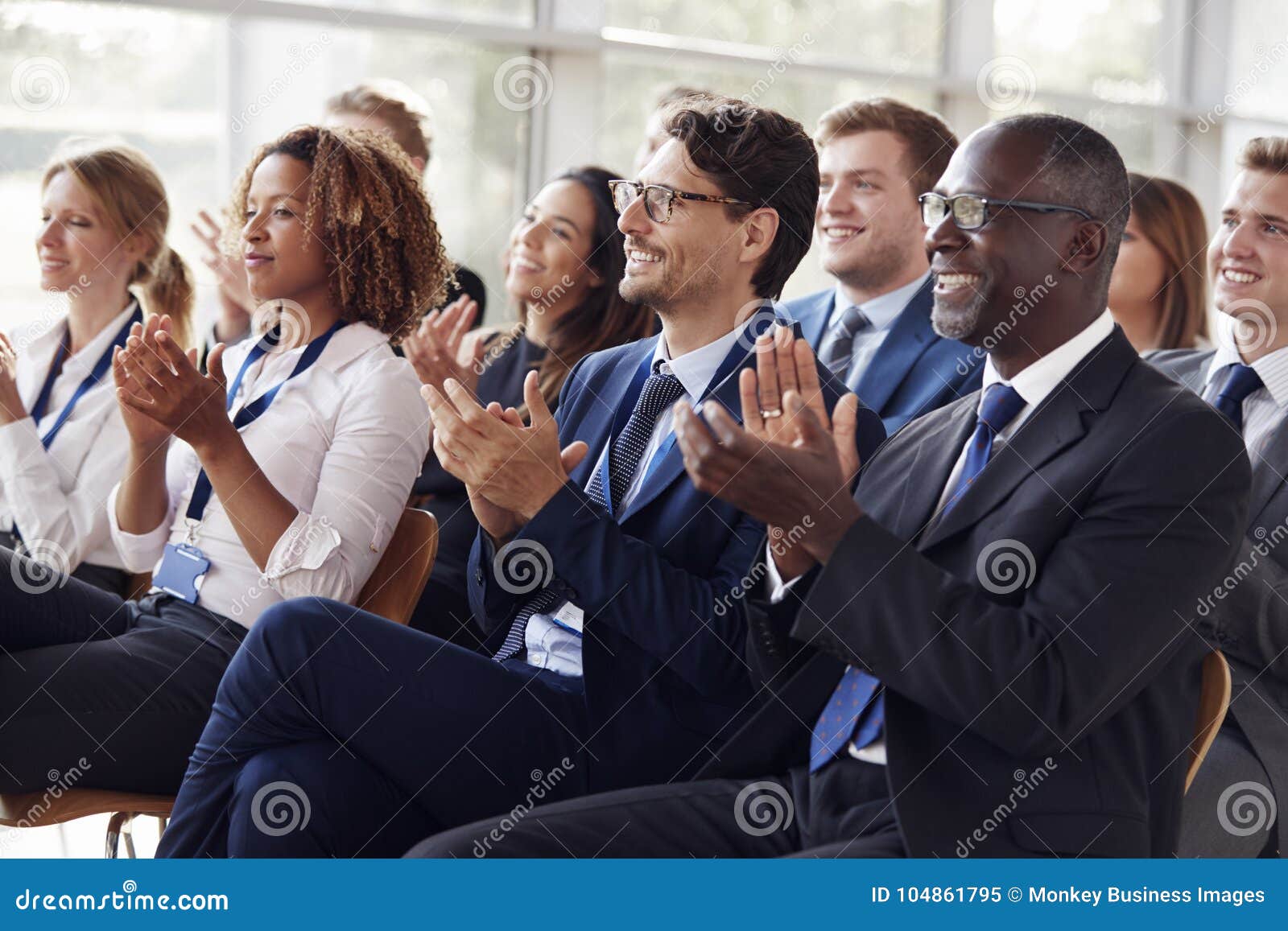 Smiling Audience Applauding at a Business Seminar Stock Image - Image ...