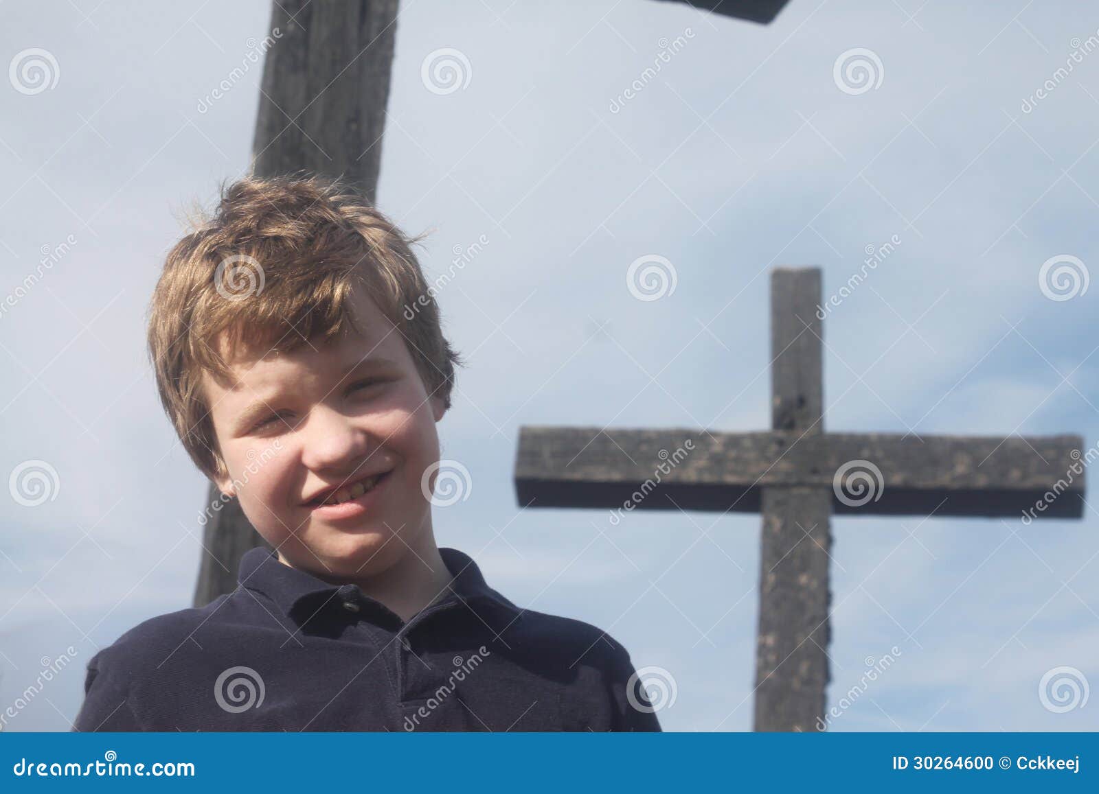 Smiling Autistic Boy in Front of a Cross Stock Photo - Image of ...