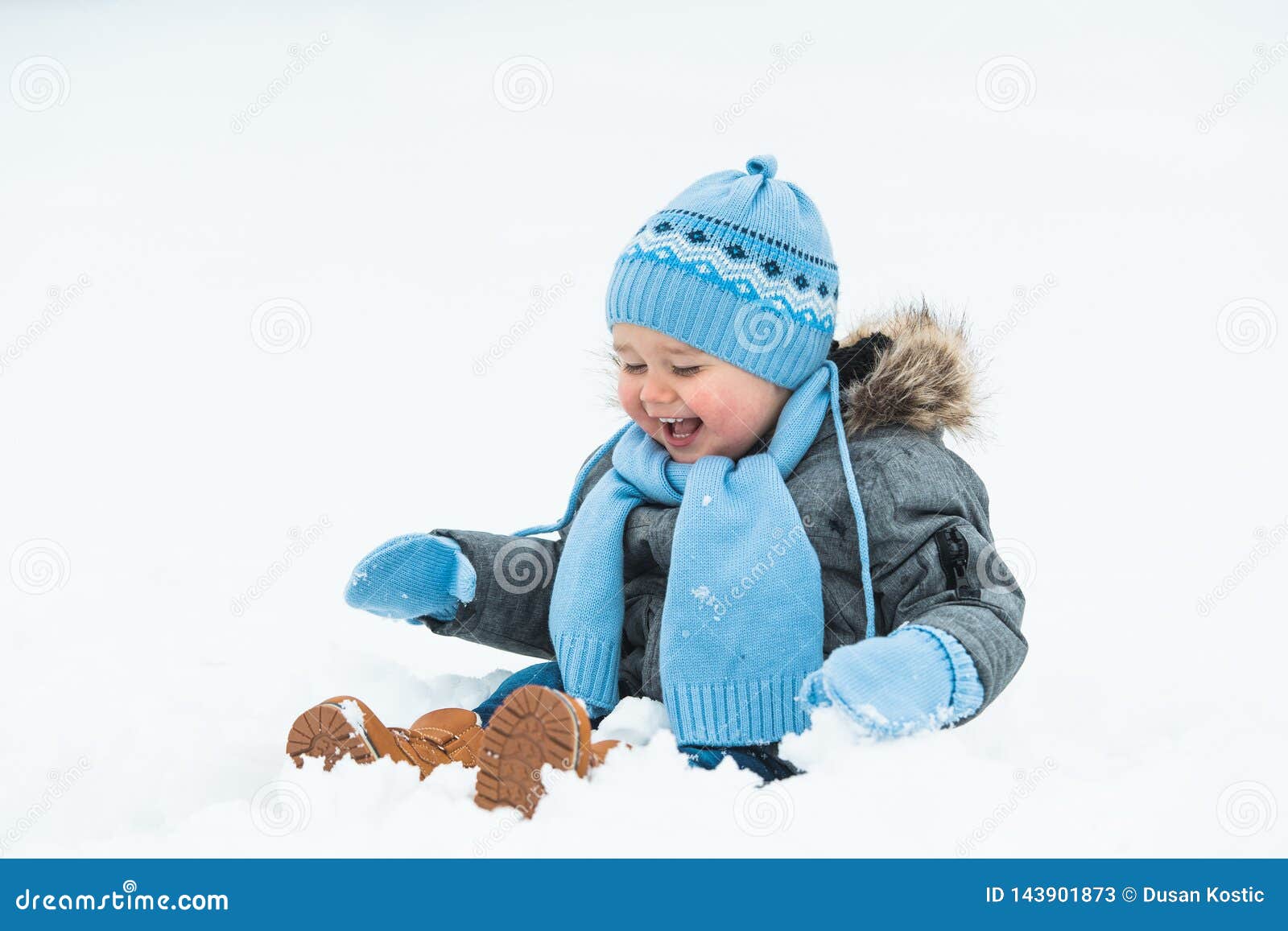 Smiling Baby Boy Playing in the Snow Stock Image - Image of winter ...