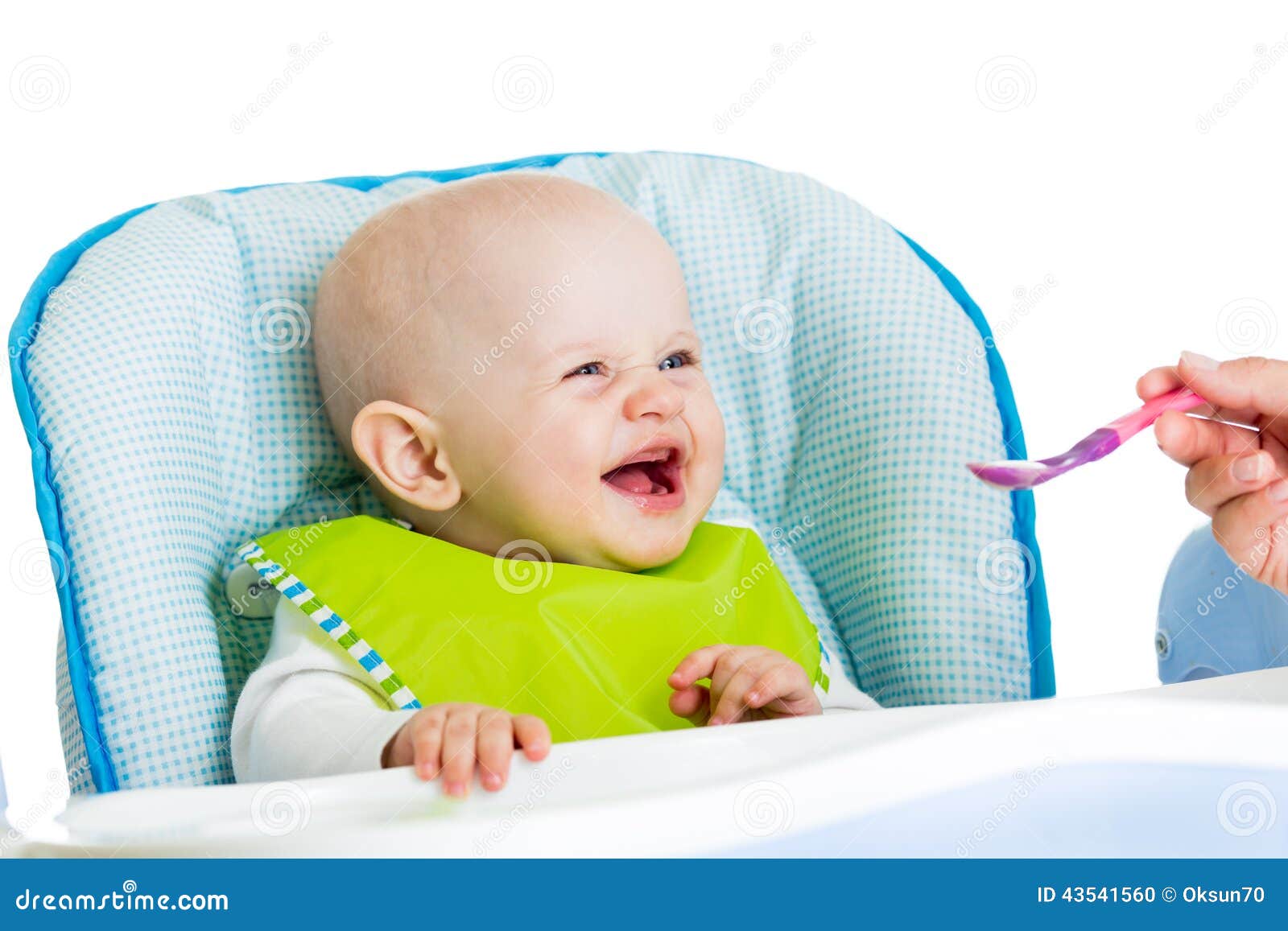 Smiling baby eating food stock photo. Image of dining - 43541560