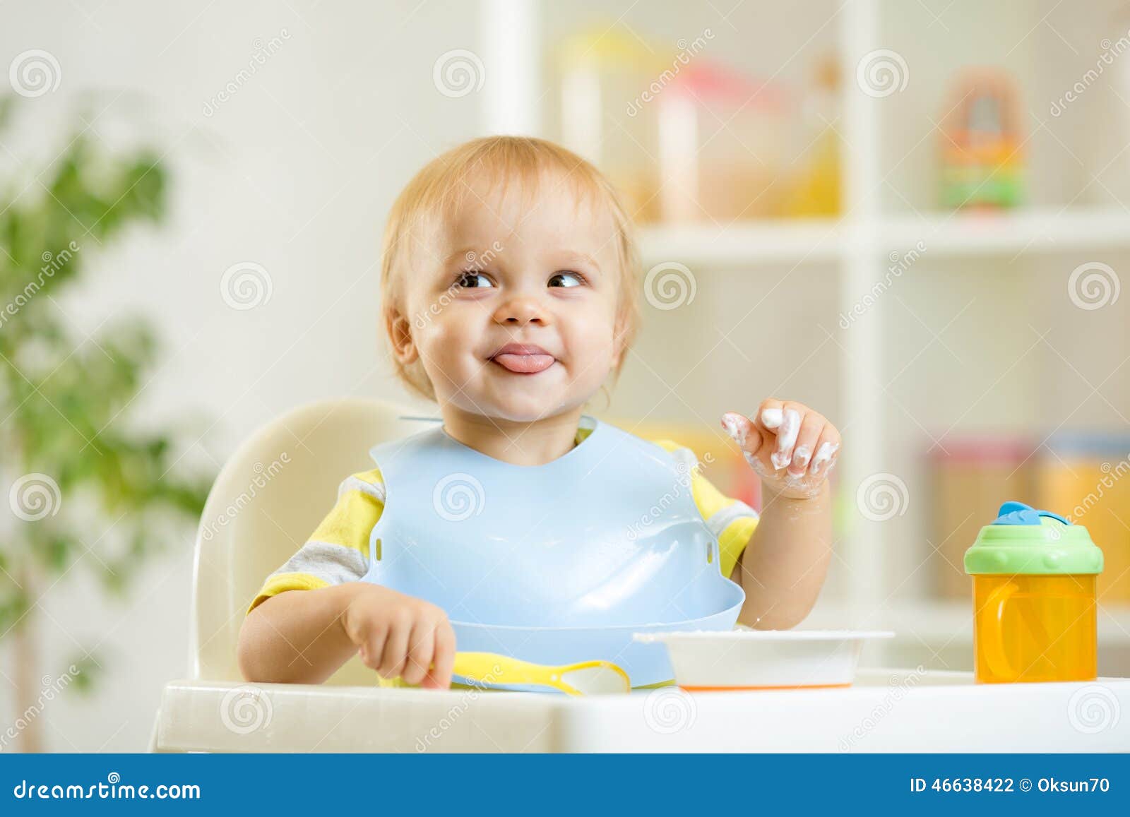 Smiling Baby Kid Boy Eating Itself with Spoon Stock Photo - Image of ...