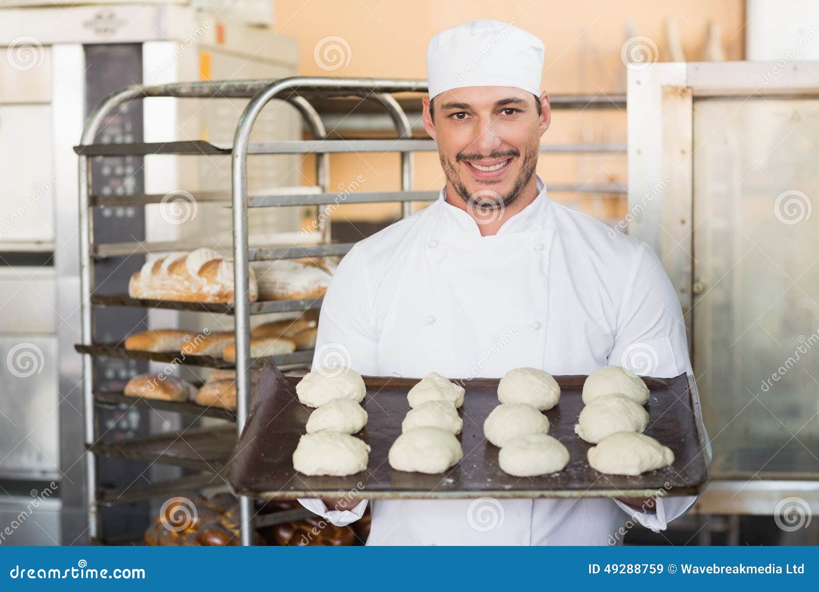 Smiling Baker Holding Tray of Raw Dough Stock Image - Image of kitchen ...