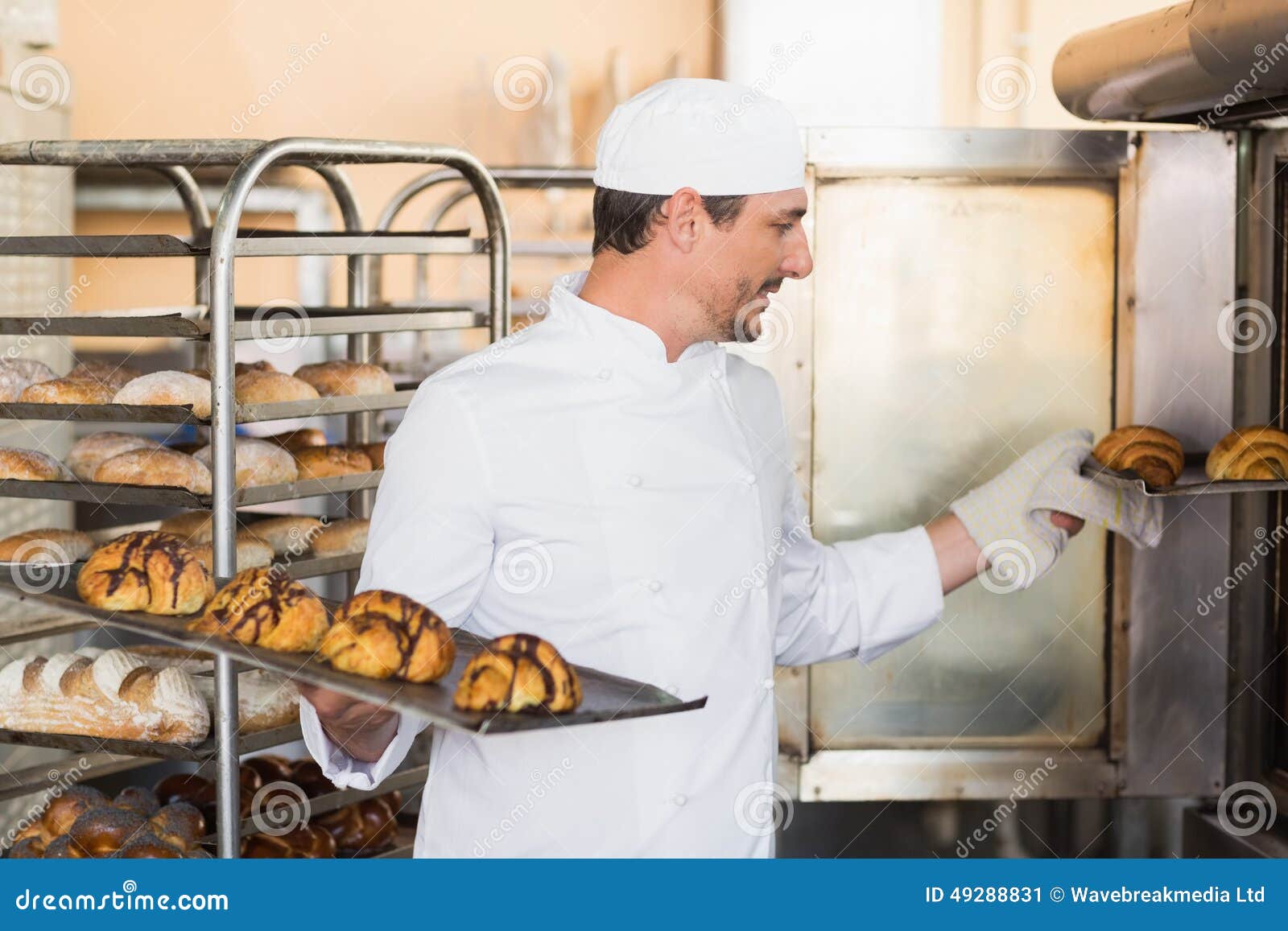 Smiling Baker Holding Trays of Croissants Stock Image - Image of bakery ...