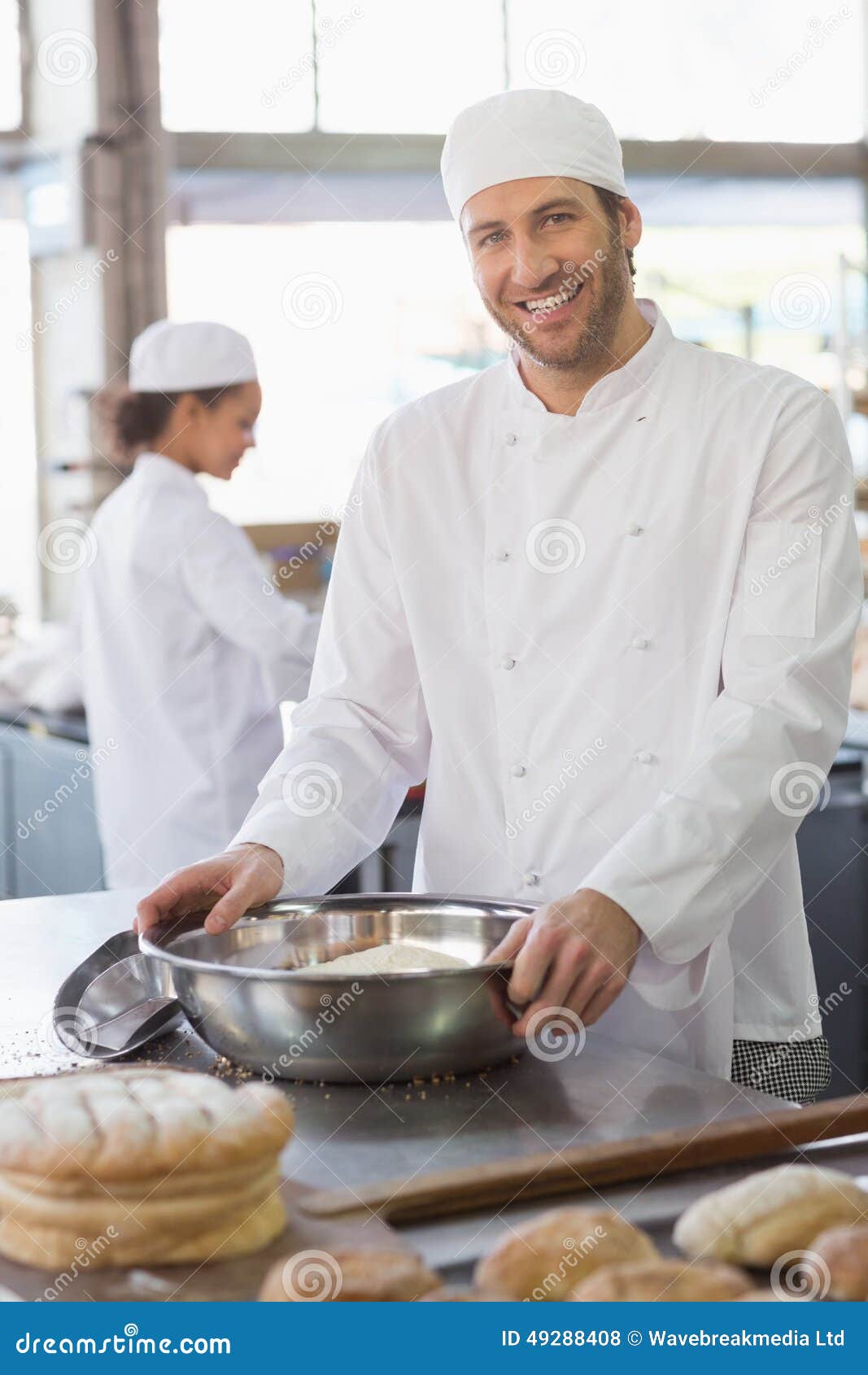 Smiling Baker Looking at Camera Stock Photo - Image of industry, female ...