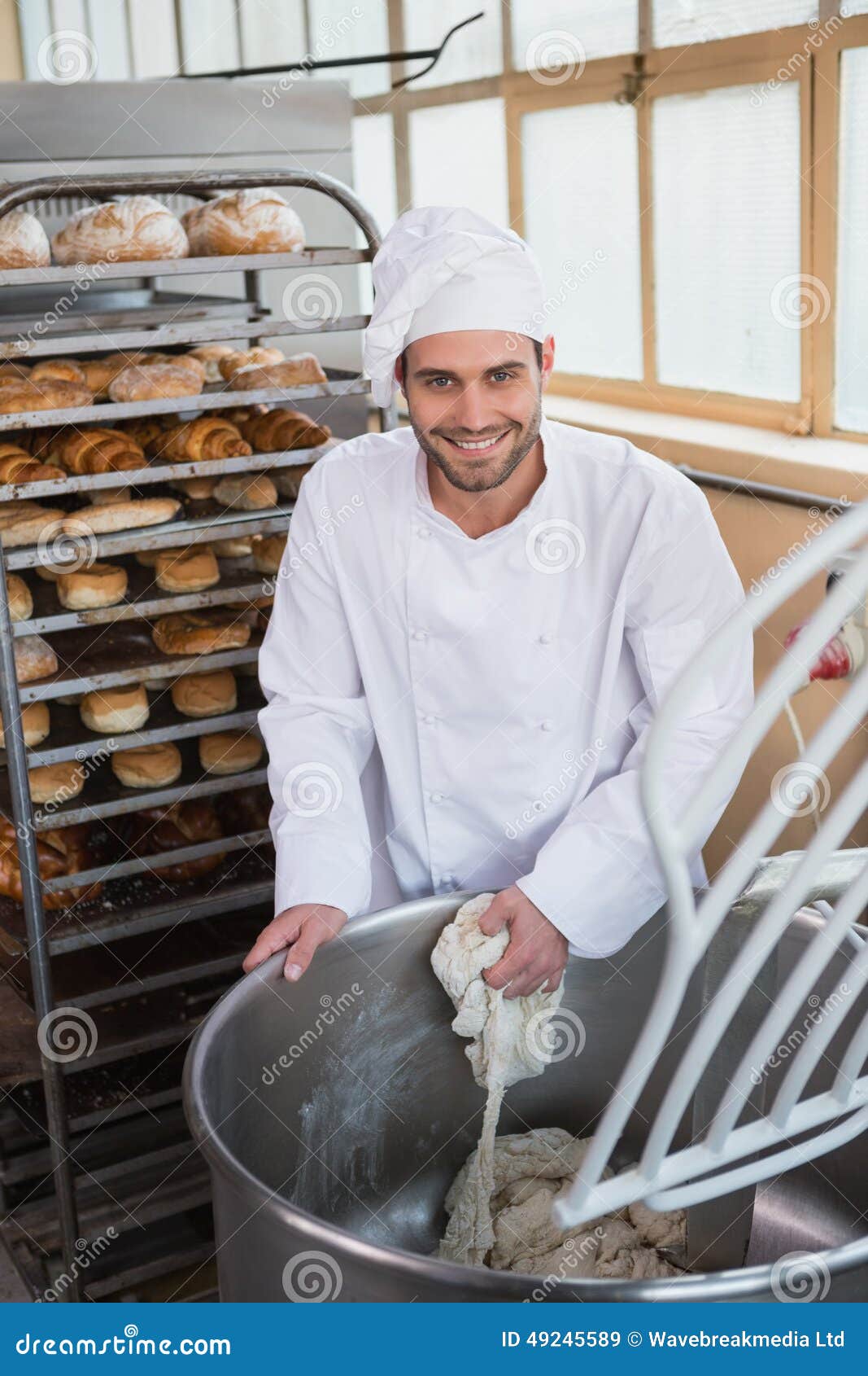 Smiling Baker Preparing Dough in Industrial Mixer Stock Image - Image ...