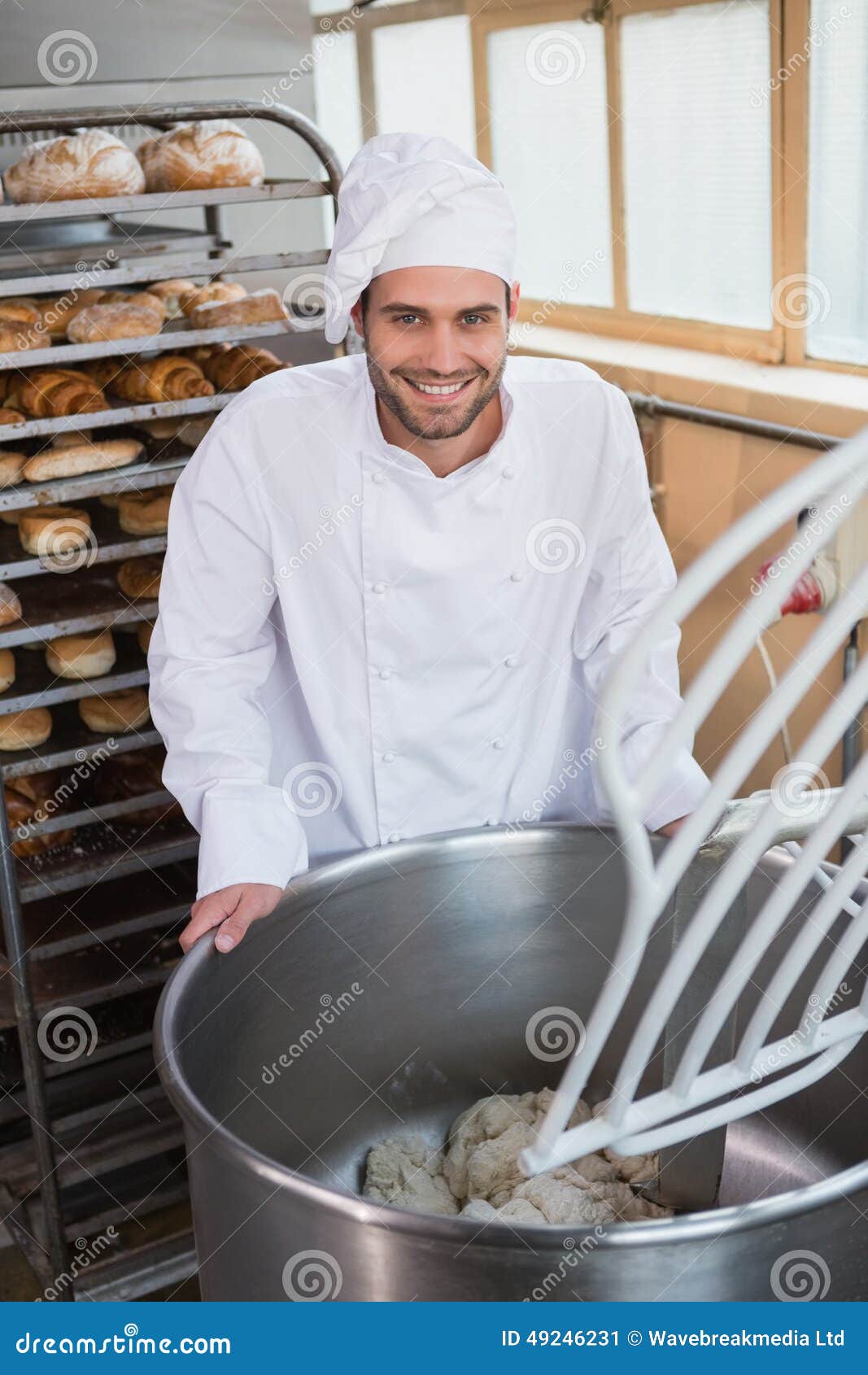 Smiling Baker Preparing Dough in Industrial Mixer Stock Image - Image ...