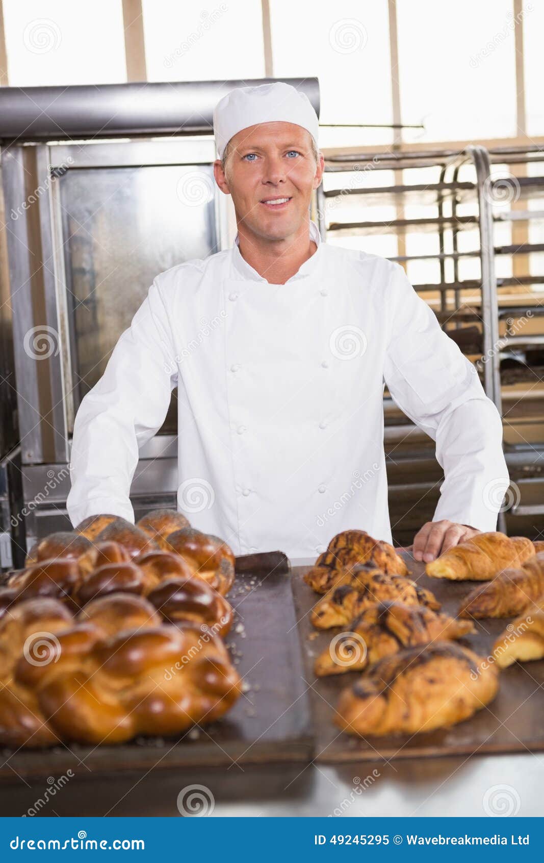 Smiling Baker Showing Board of Breads Stock Image - Image of business ...