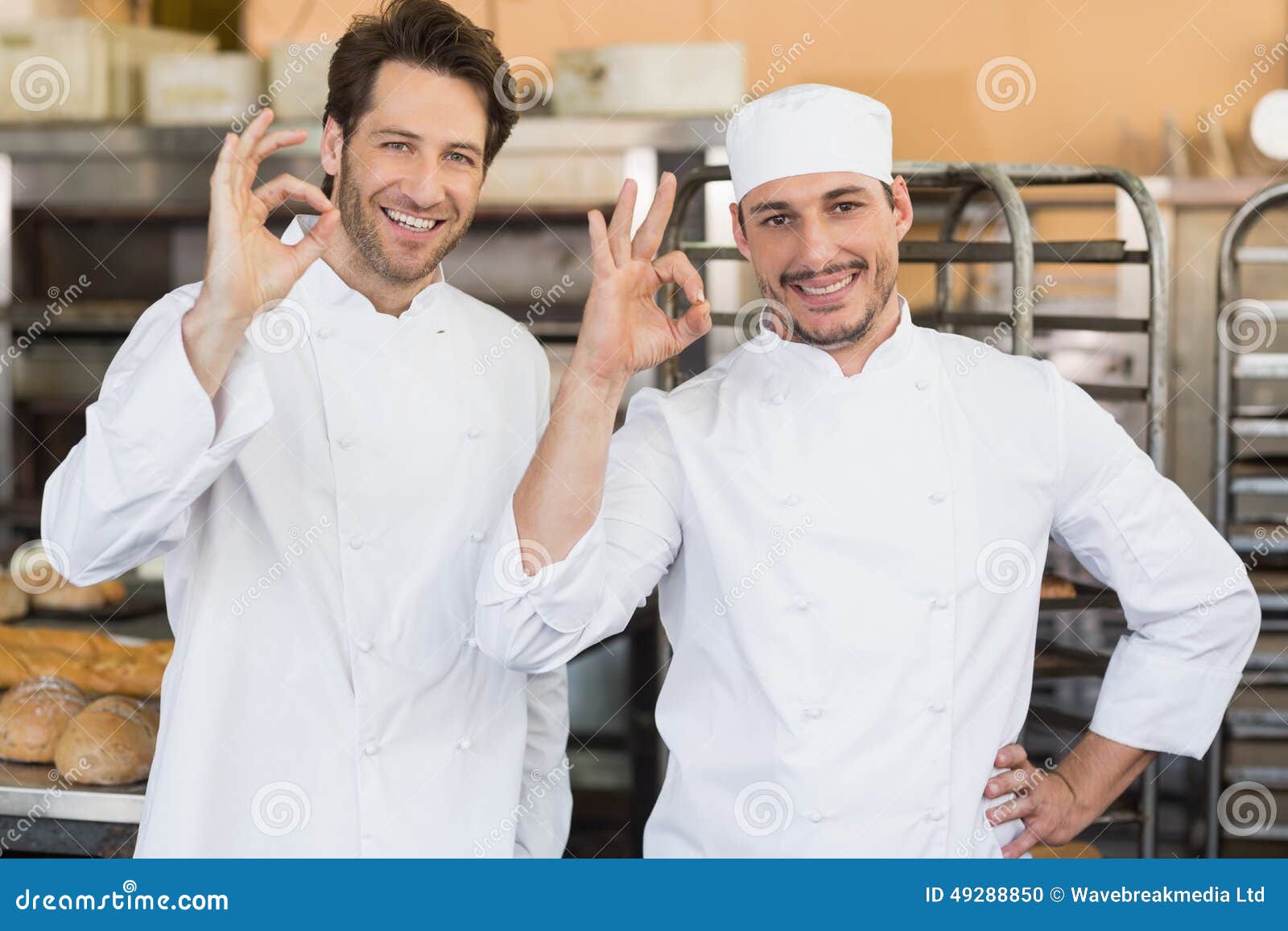 Smiling Bakers Looking at Camera Stock Photo - Image of communication ...