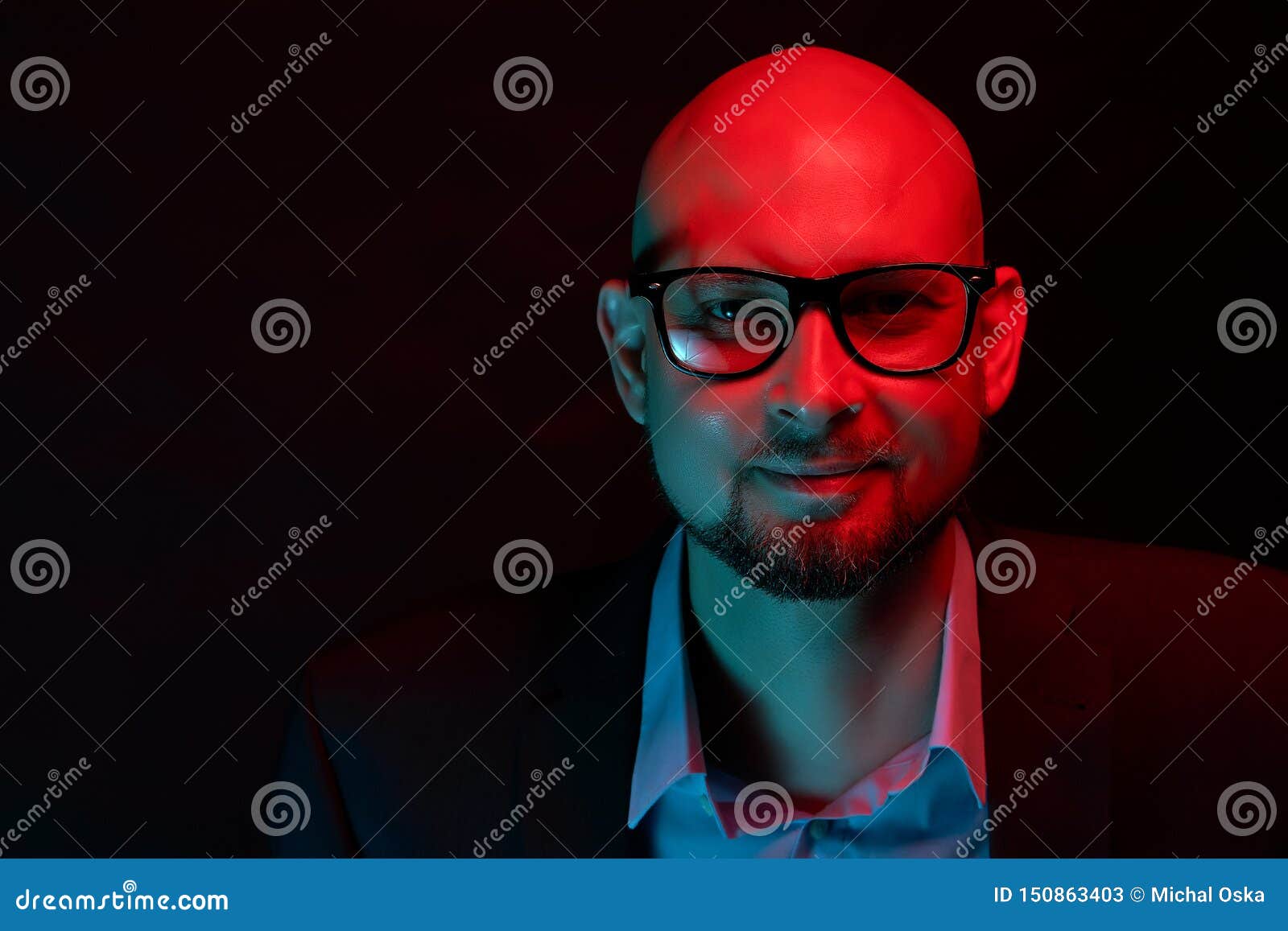 Smiling Bald Attractive Man in Suit on Neon Light Background Stock ...