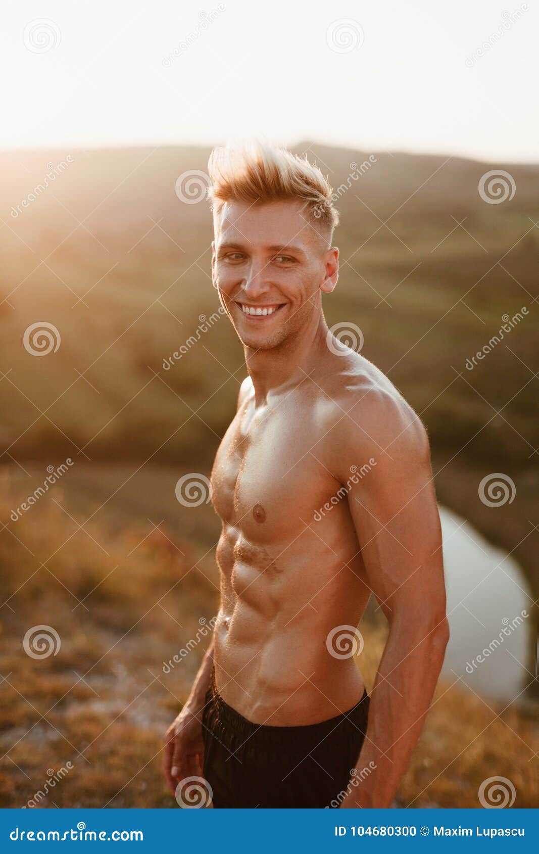 Smiling bare-chested man stock photo. Image of freedom - 104680300