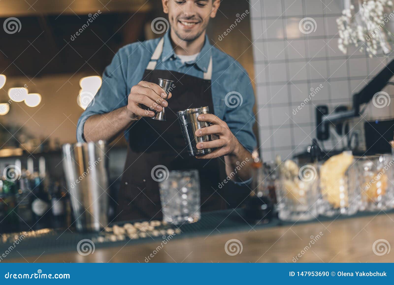 Smiling Bartender Adding Ingredients To the Cocktail Stock Photo ...