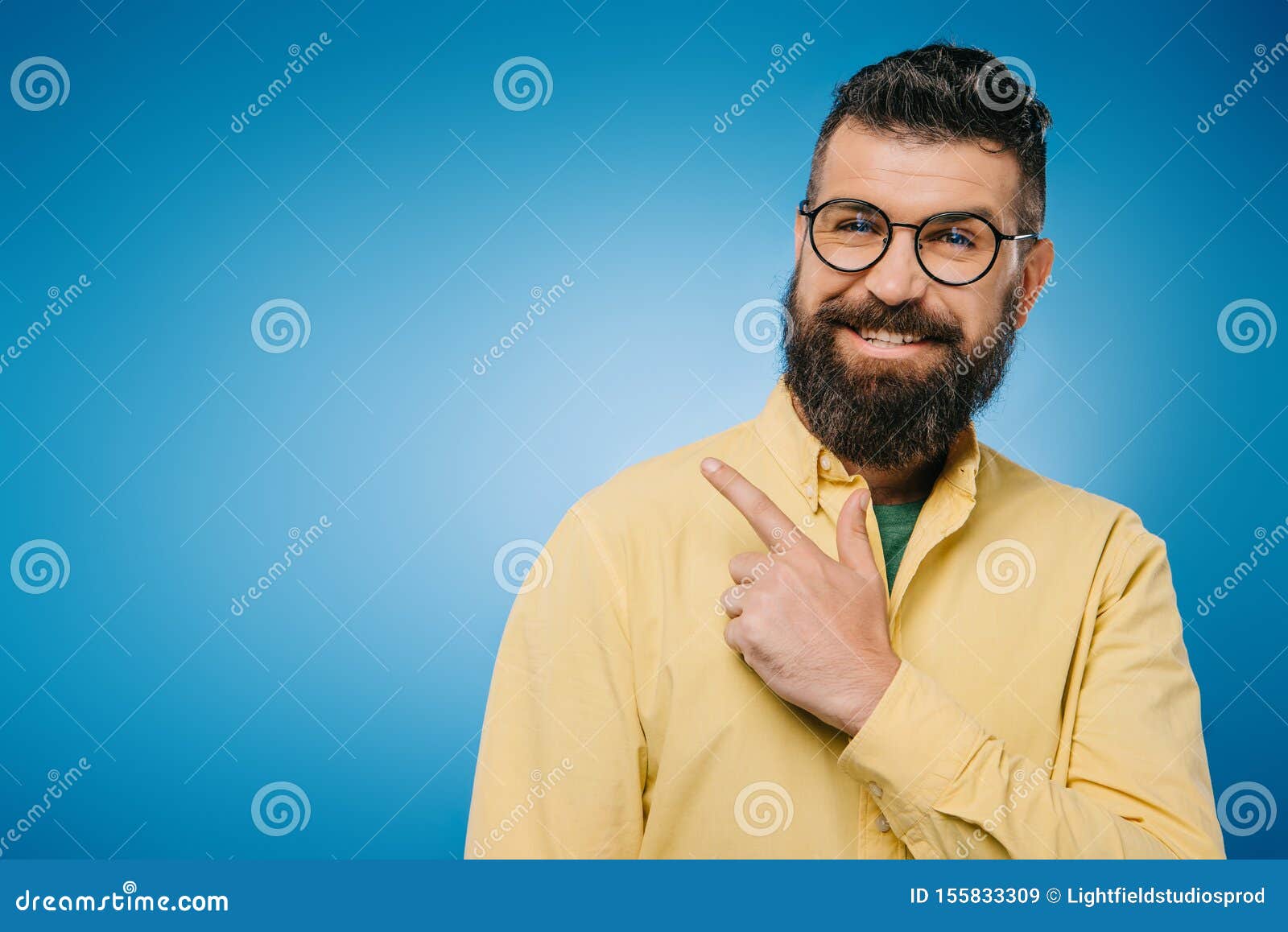 Smiling Bearded Man In Eyeglasses Pointing Isolated Stock Image Image