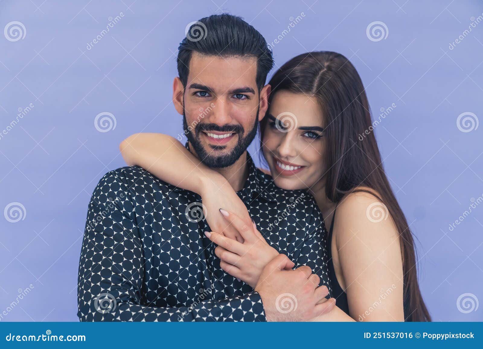 Smiling Beautiful Heterocouple Standing Next To Each Other Hugging