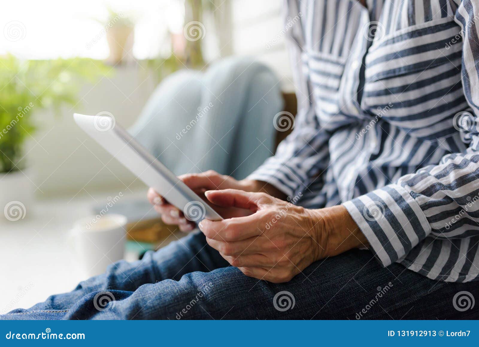Smiling Beautiful Senior Woman Using Digital Tablet at Home Stock Image ...