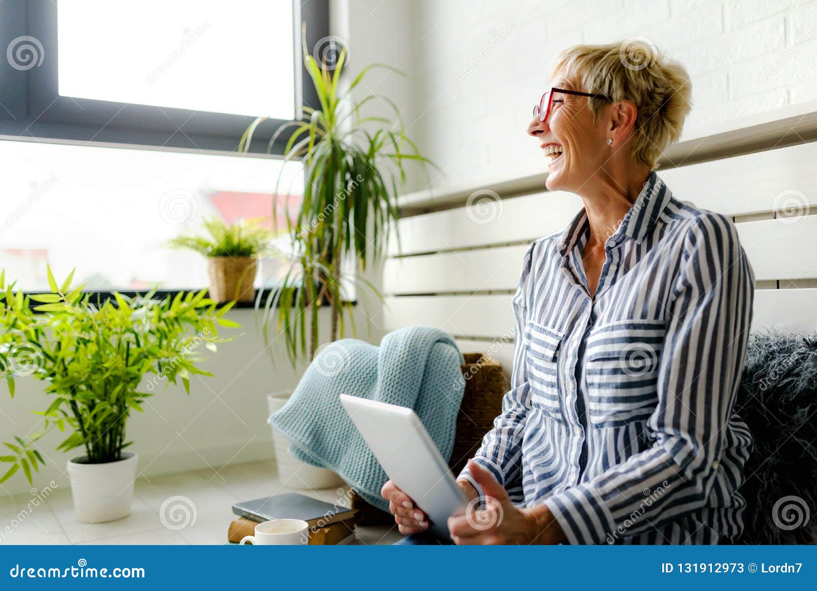 Smiling Beautiful Senior Woman Using Digital Tablet at Home Stock Image ...