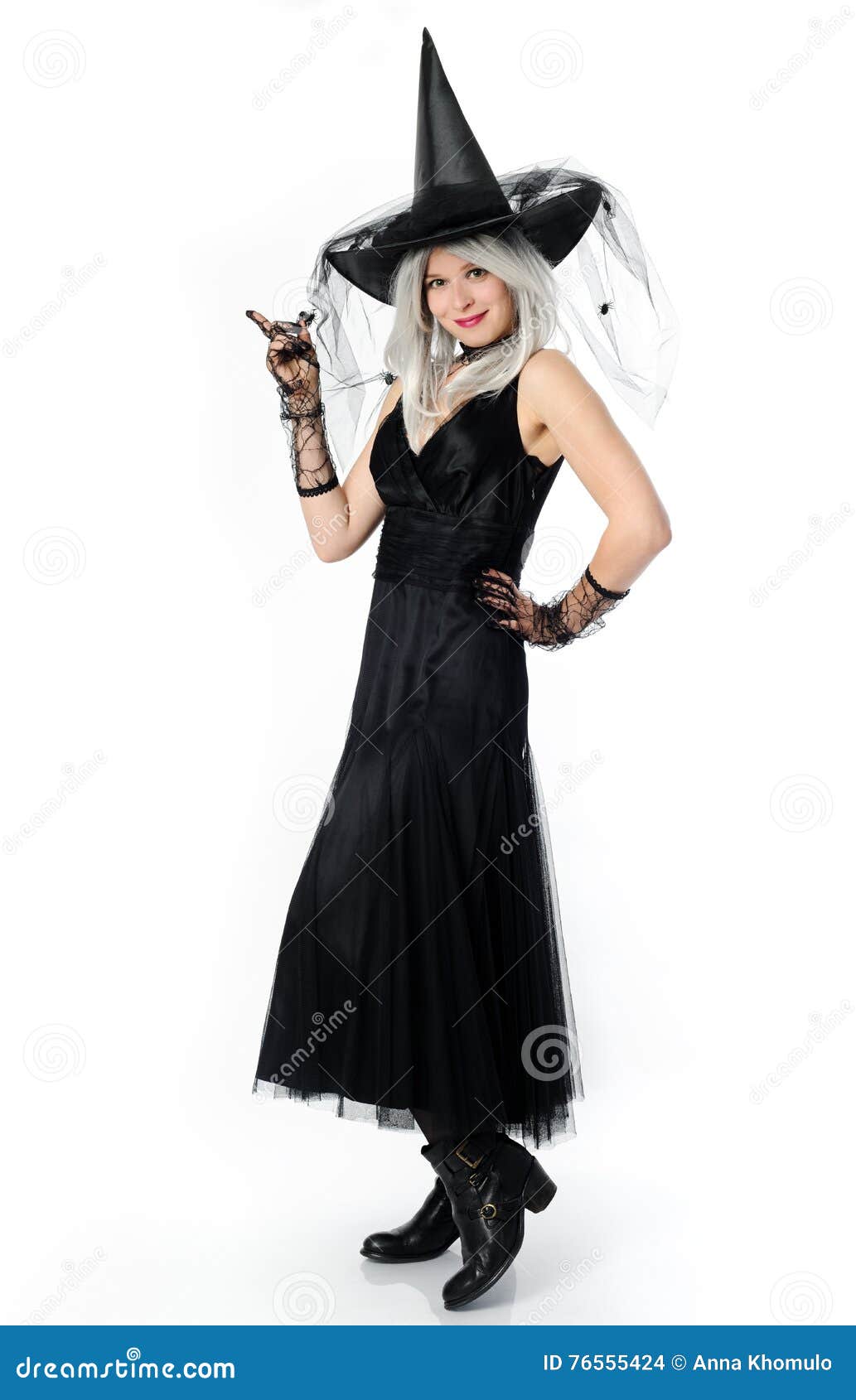 Smiling beautiful witch stock photo. Image of fancy, woman - 76555424