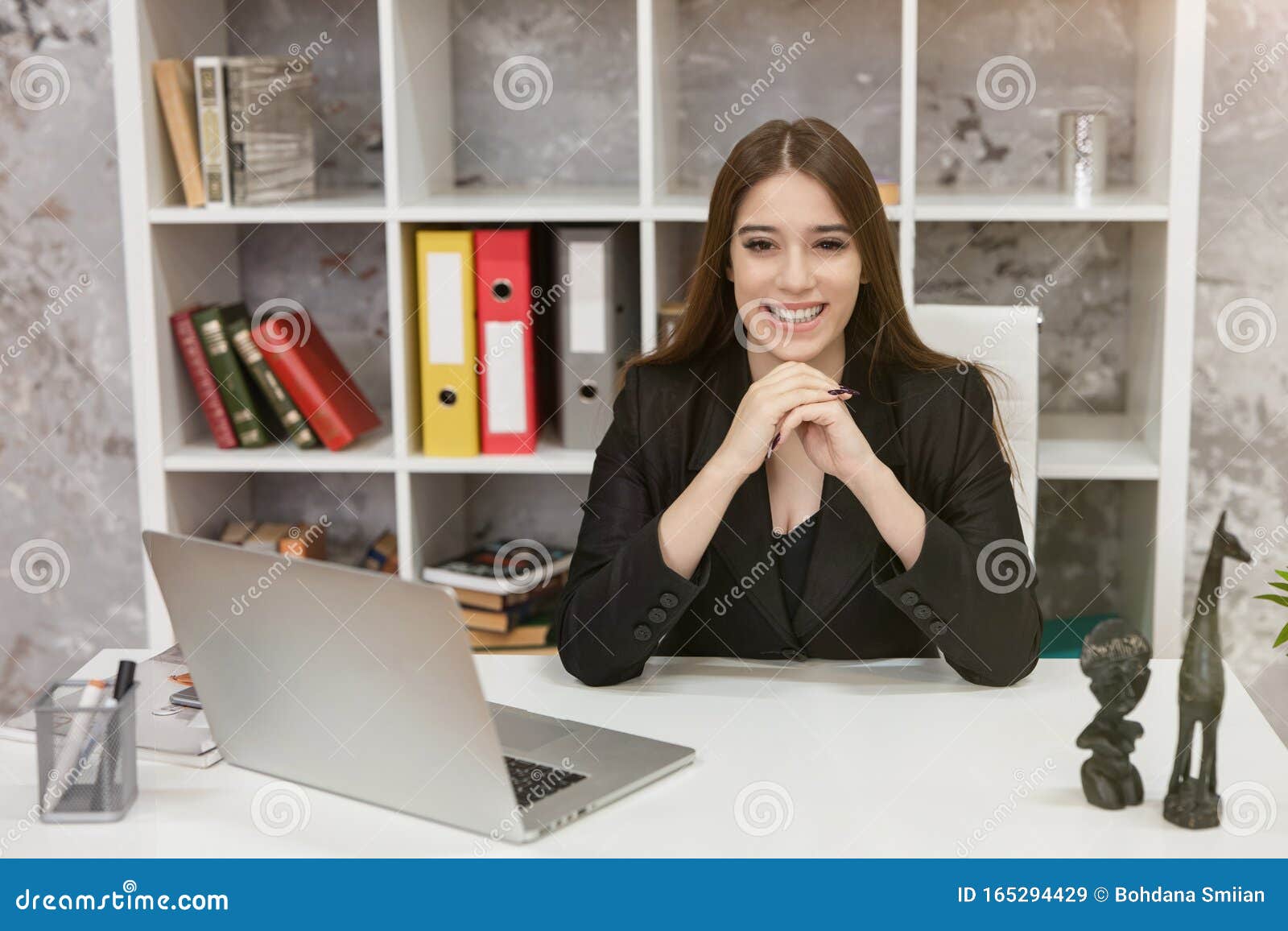 Smiling Beautiful Woman Manager With Laptop Sitting At Her Working
