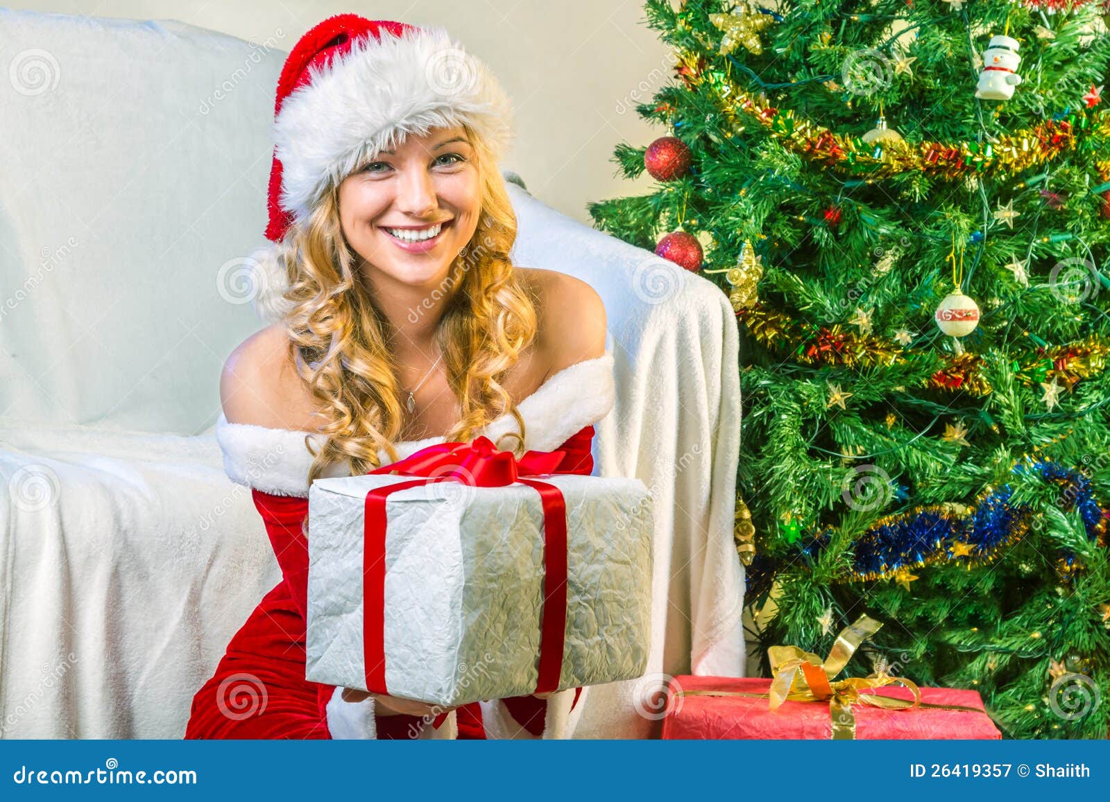 Smiling Beautiful Young Woman Giving a Gift Stock Image - Image of ...