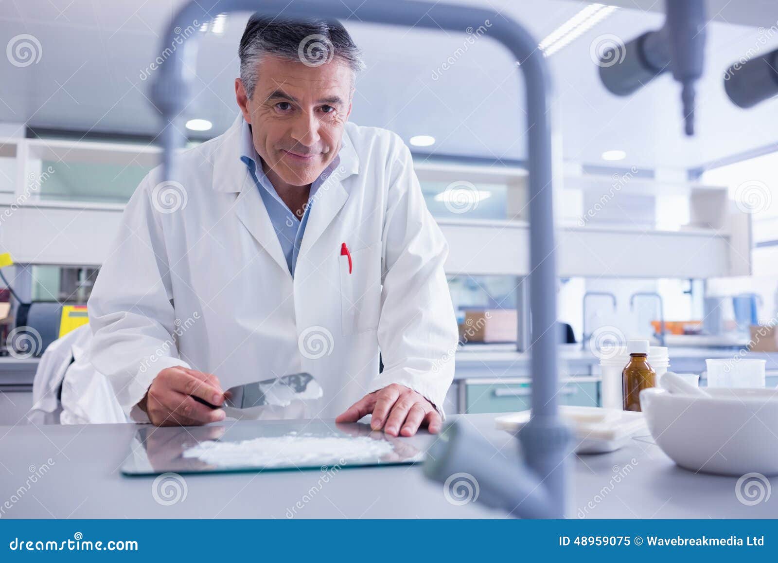 Smiling Biochemist Preparing Some Medicine Stock Image - Image of ...