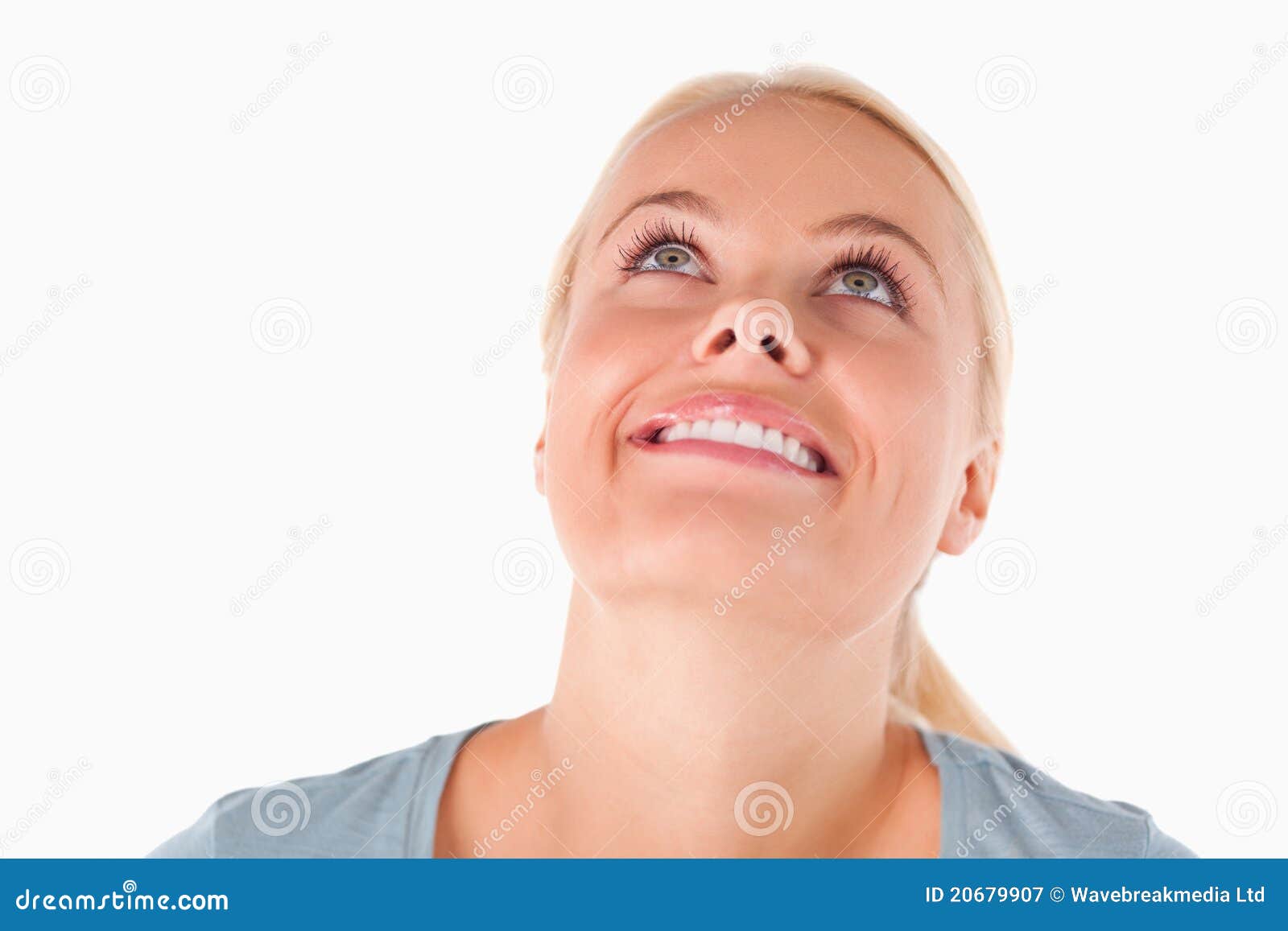 Smiling Blond Woman Looking at the Ceiling Stock Image - Image of ...