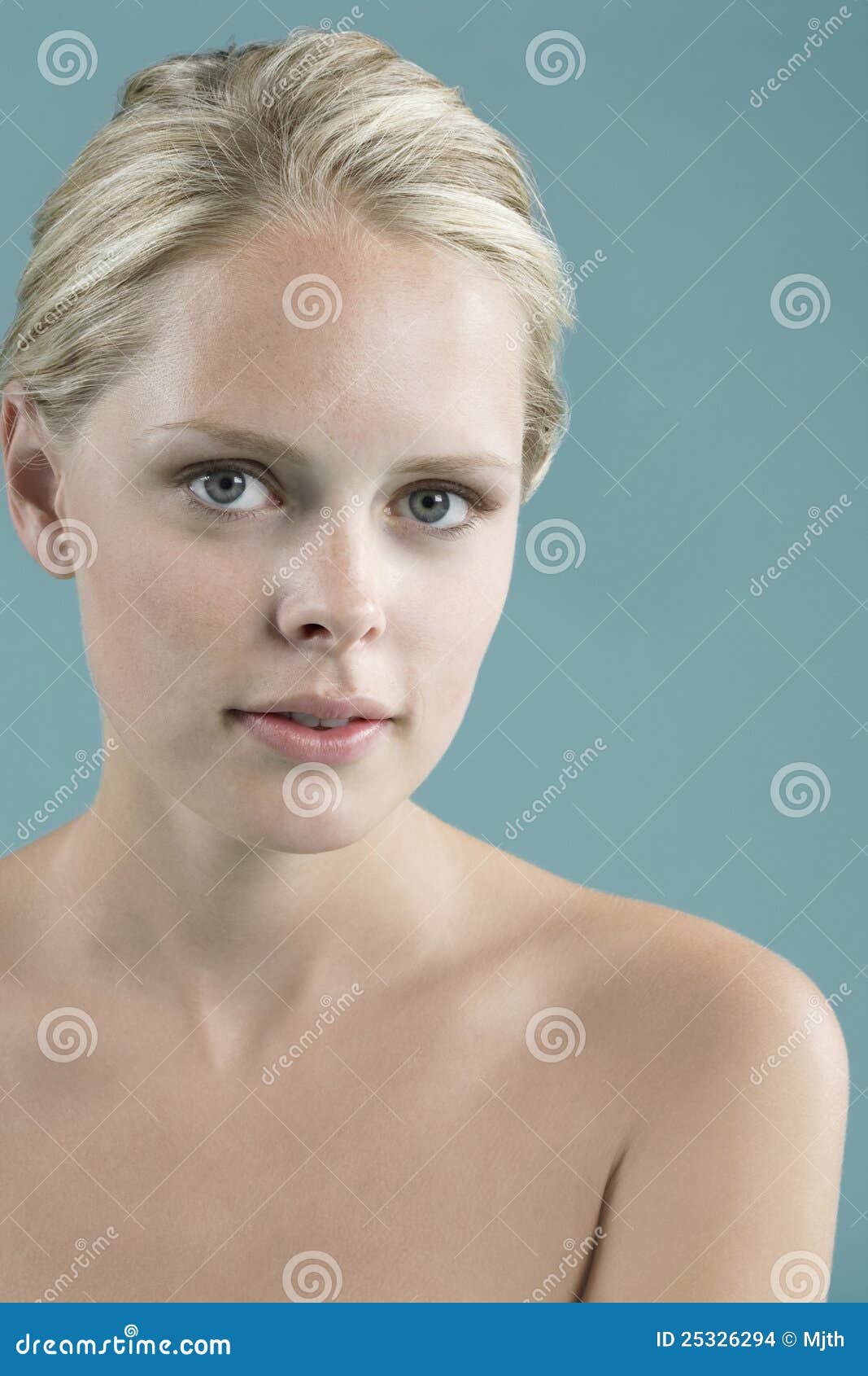 Smiling on Blue Background stock photo. Image of gorgeous - 25326294