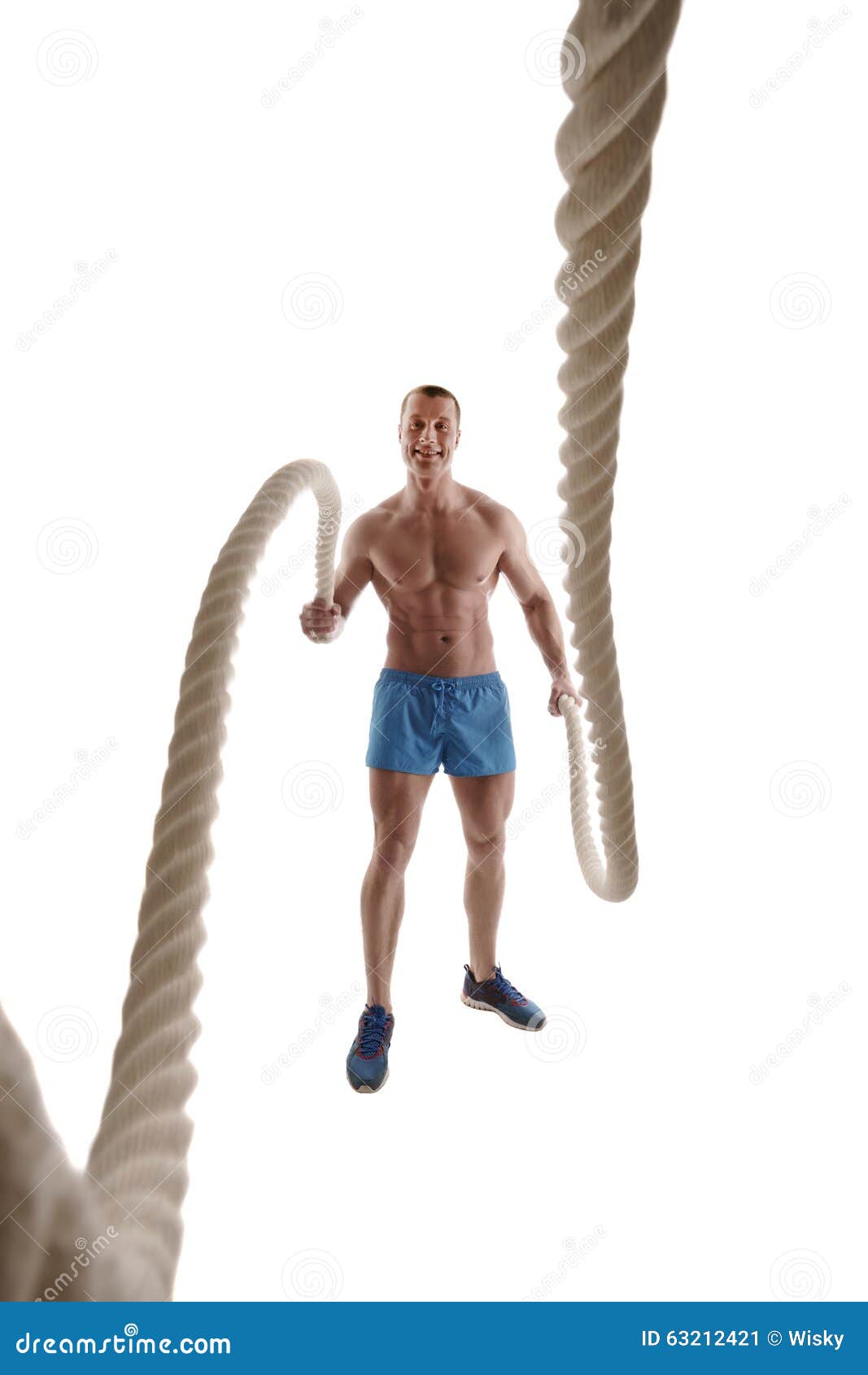 Smiling Bodybuilder Exercising with Rope Stock Image - Image of shorts ...