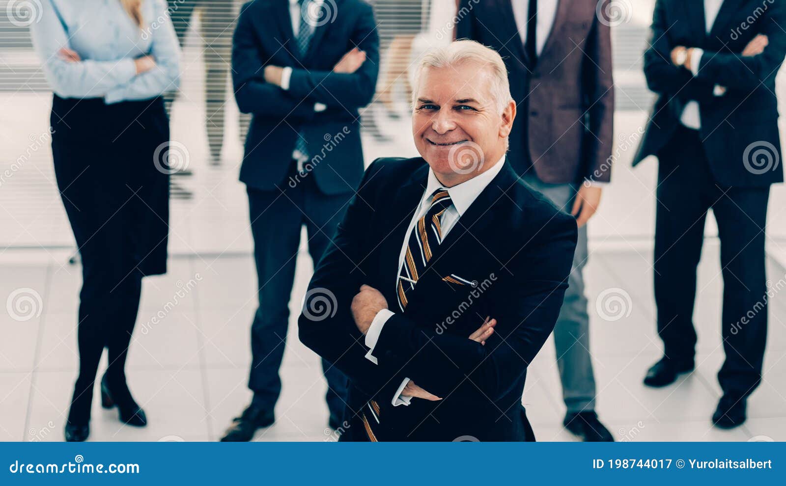 Smiling Boss and a Group of Different Employees Standing in the Office ...